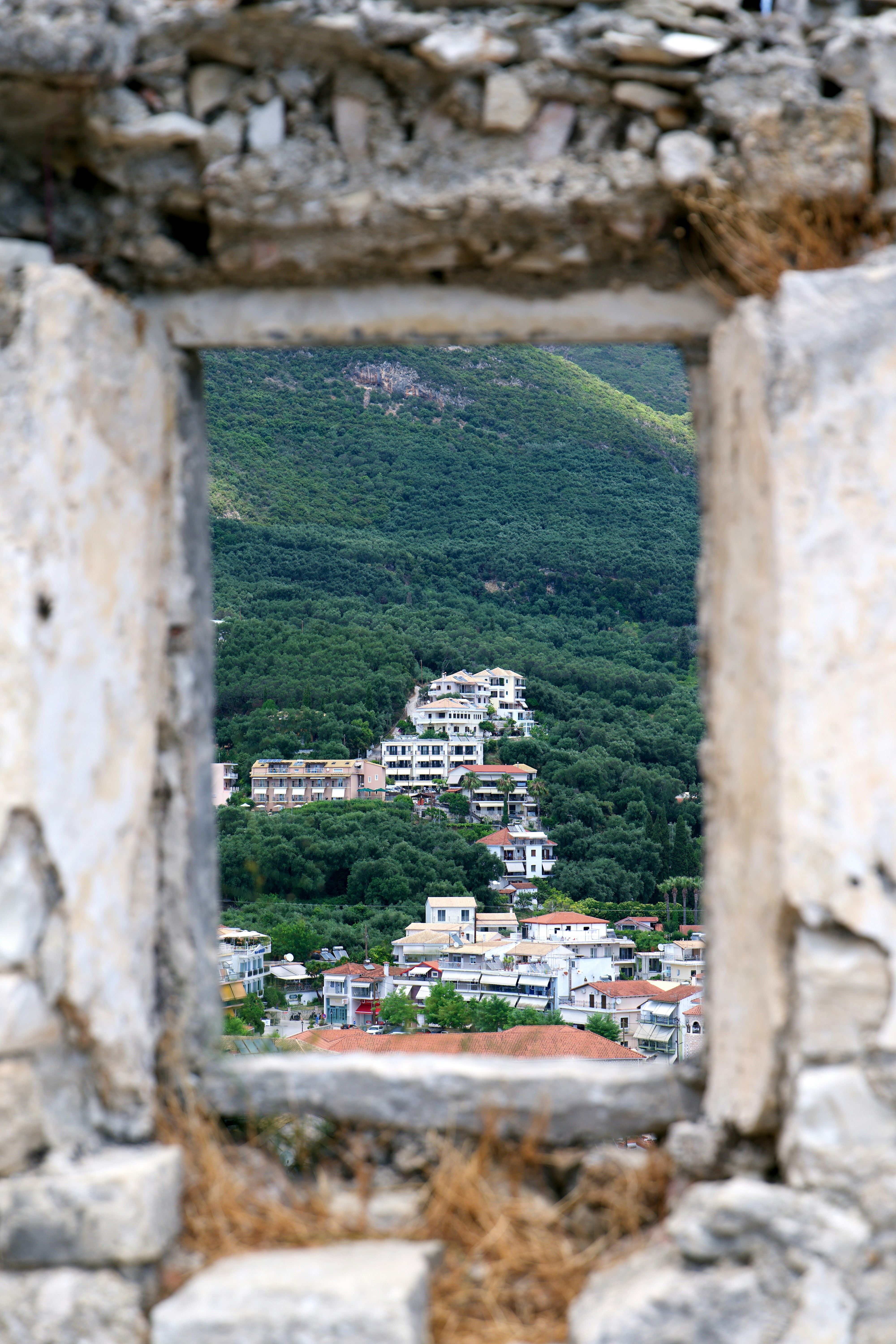 Towering View Through a Weathered Window