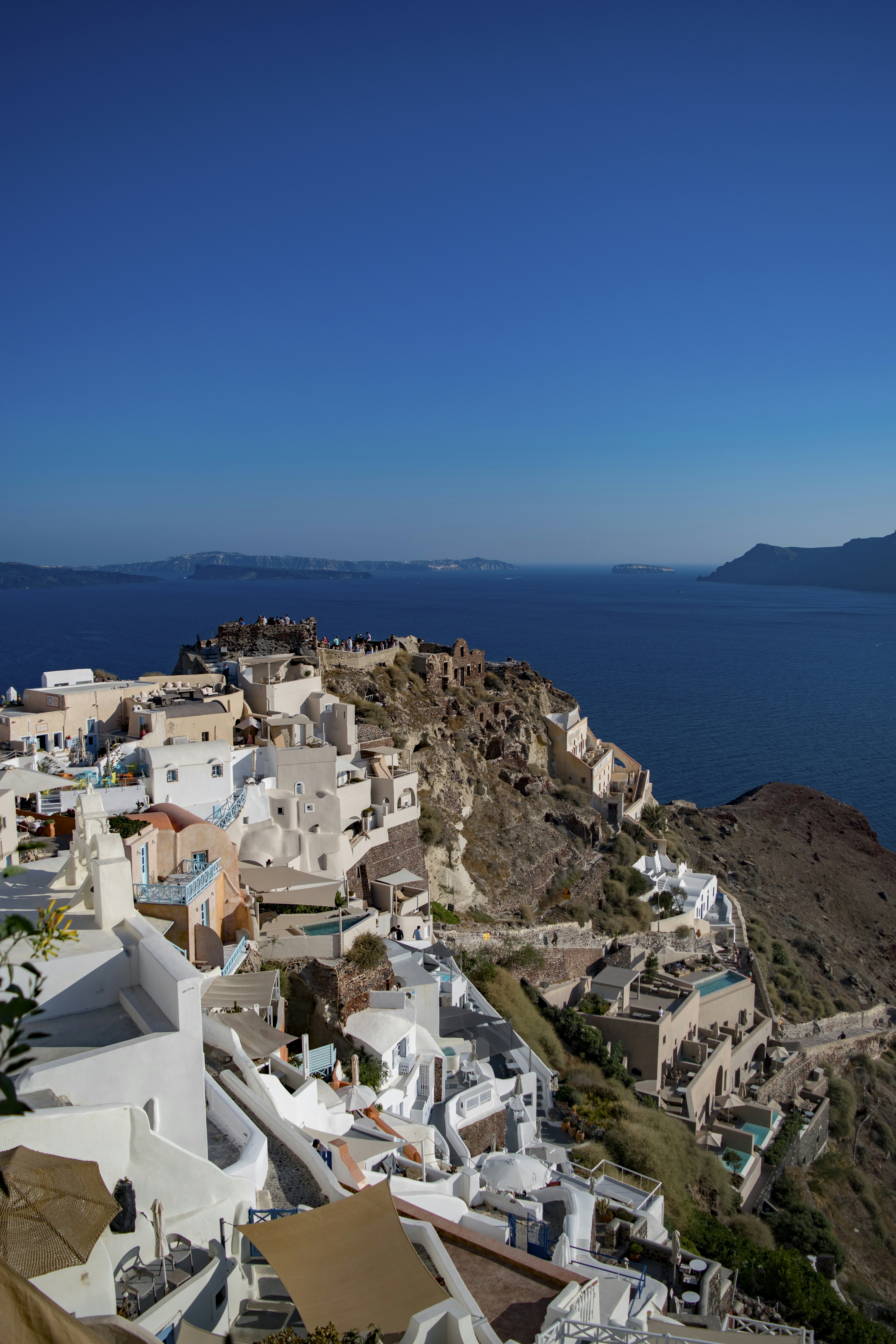 Cliffside Santorini: Whitewashed Geometry Against Aegean Blue