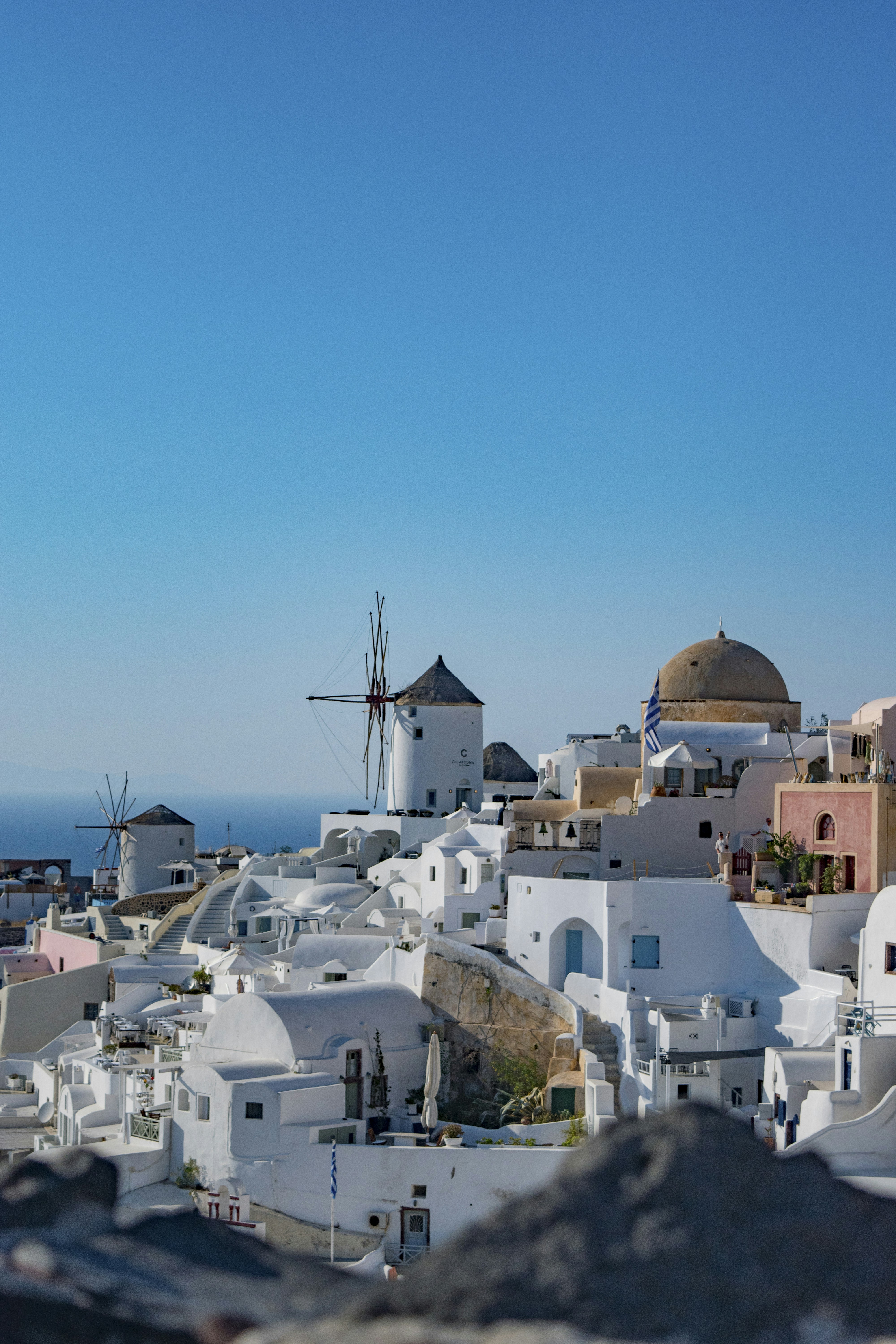 White-washed Cycladic Village Under a Cerulean Sky