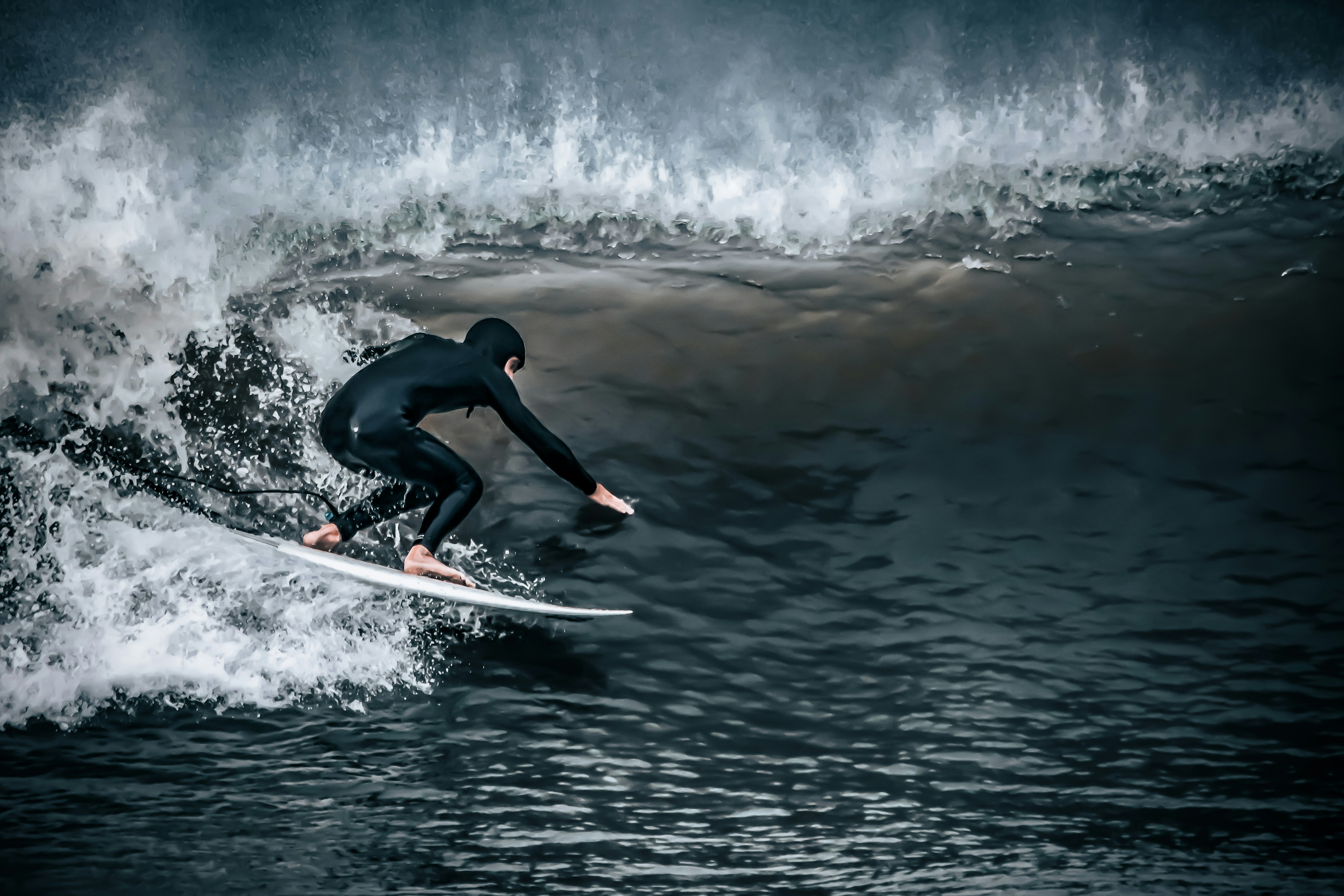 Horizon Rider: A surfer carving through a curling ocean monster