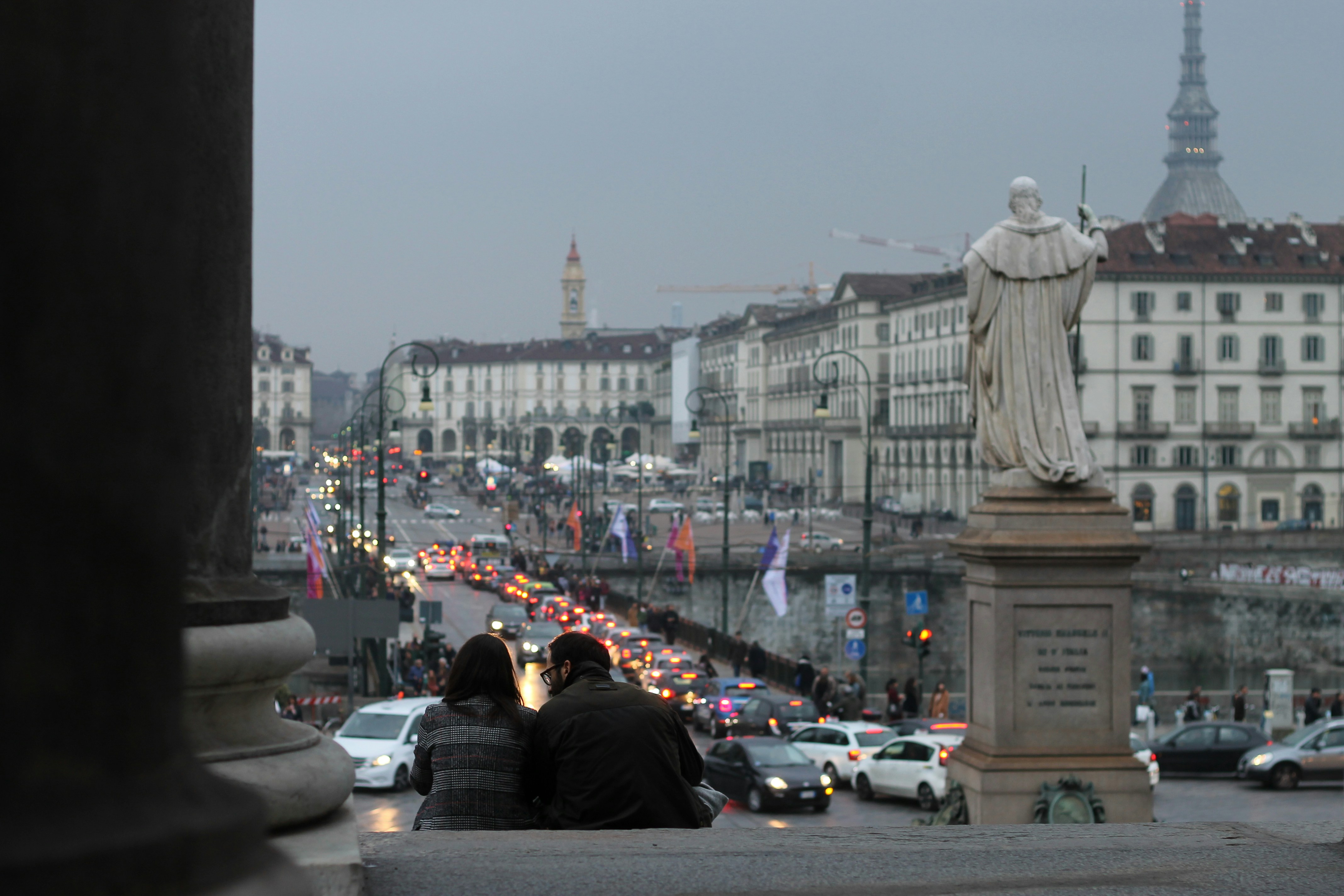 Couple on the Bridge: Evening Retrace Over Prague’s Vltava