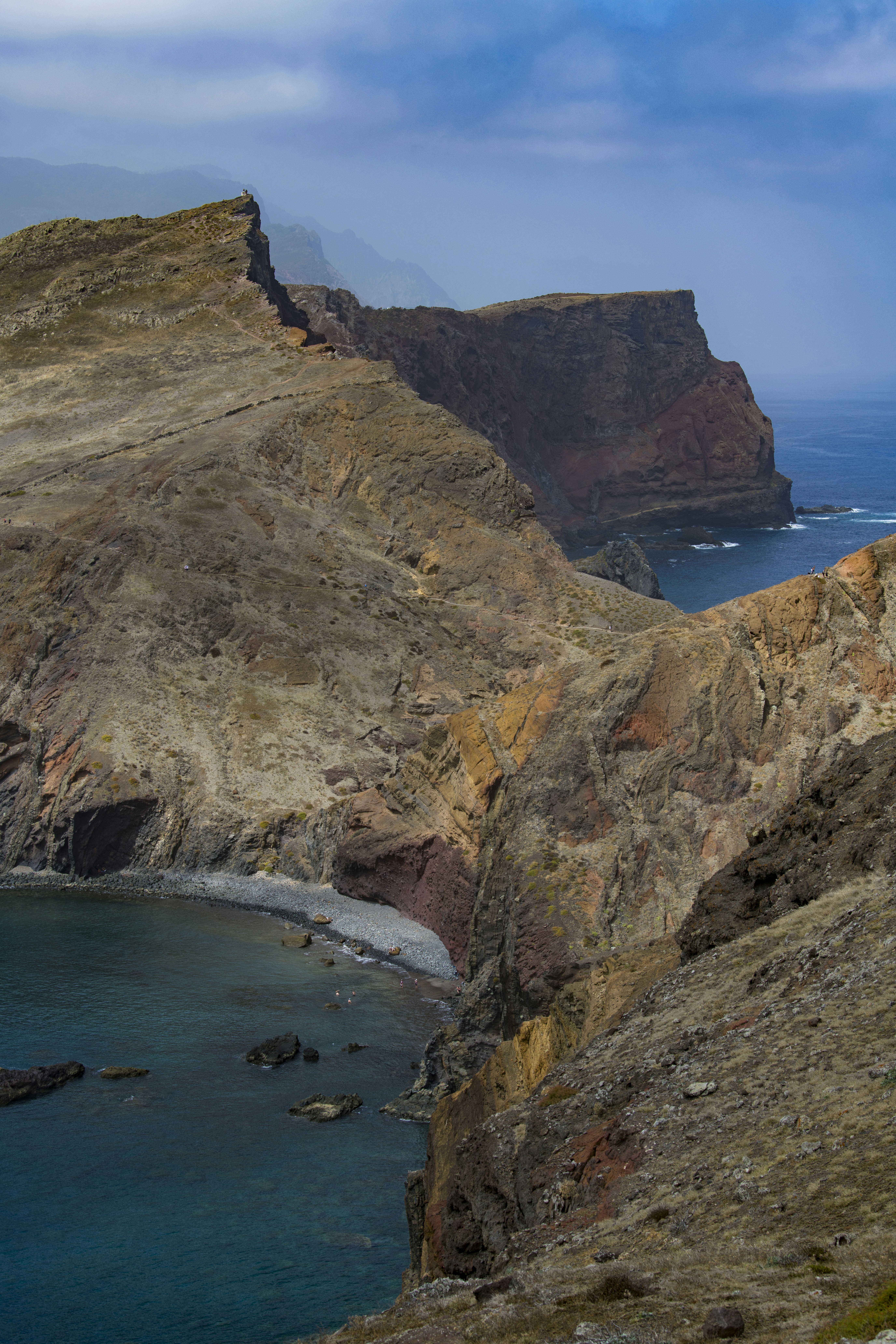 Steep Coastal Cliffs Meet the Quiet Sea