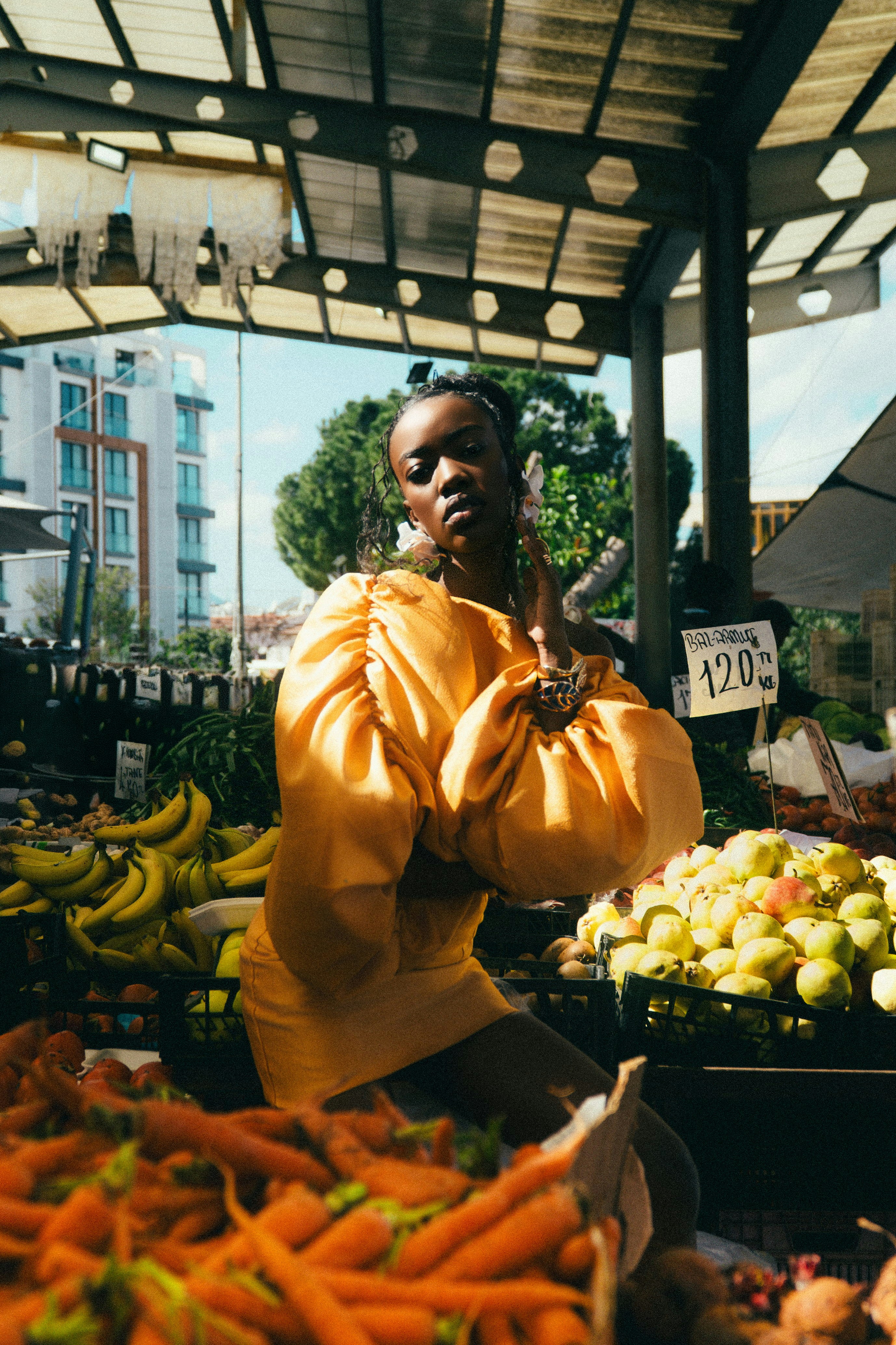 Golden Glow: A Portrait Amid Market Vitality