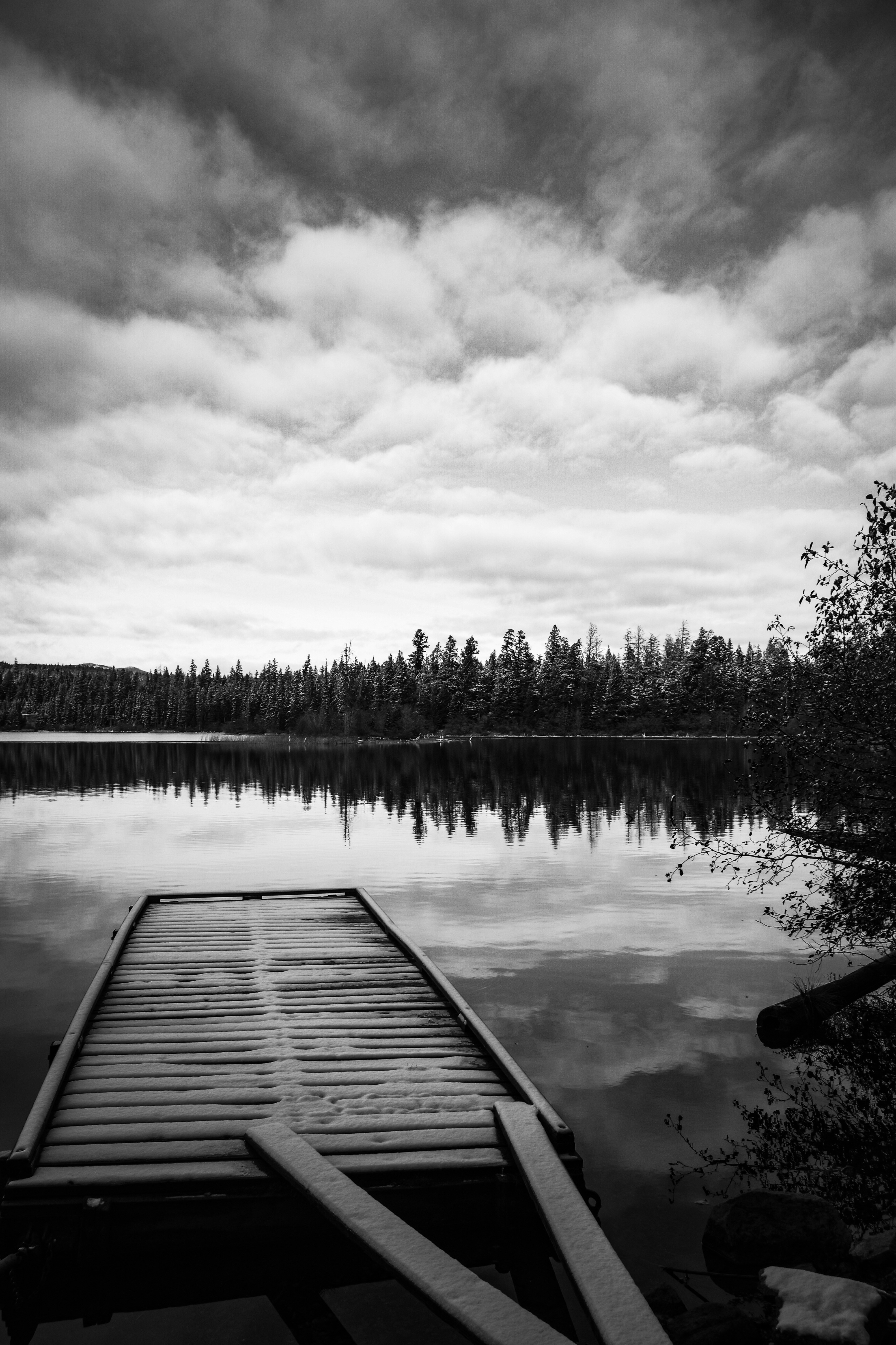 Quiet Mirror: A Lone Dock Reaches into a Winter Lake