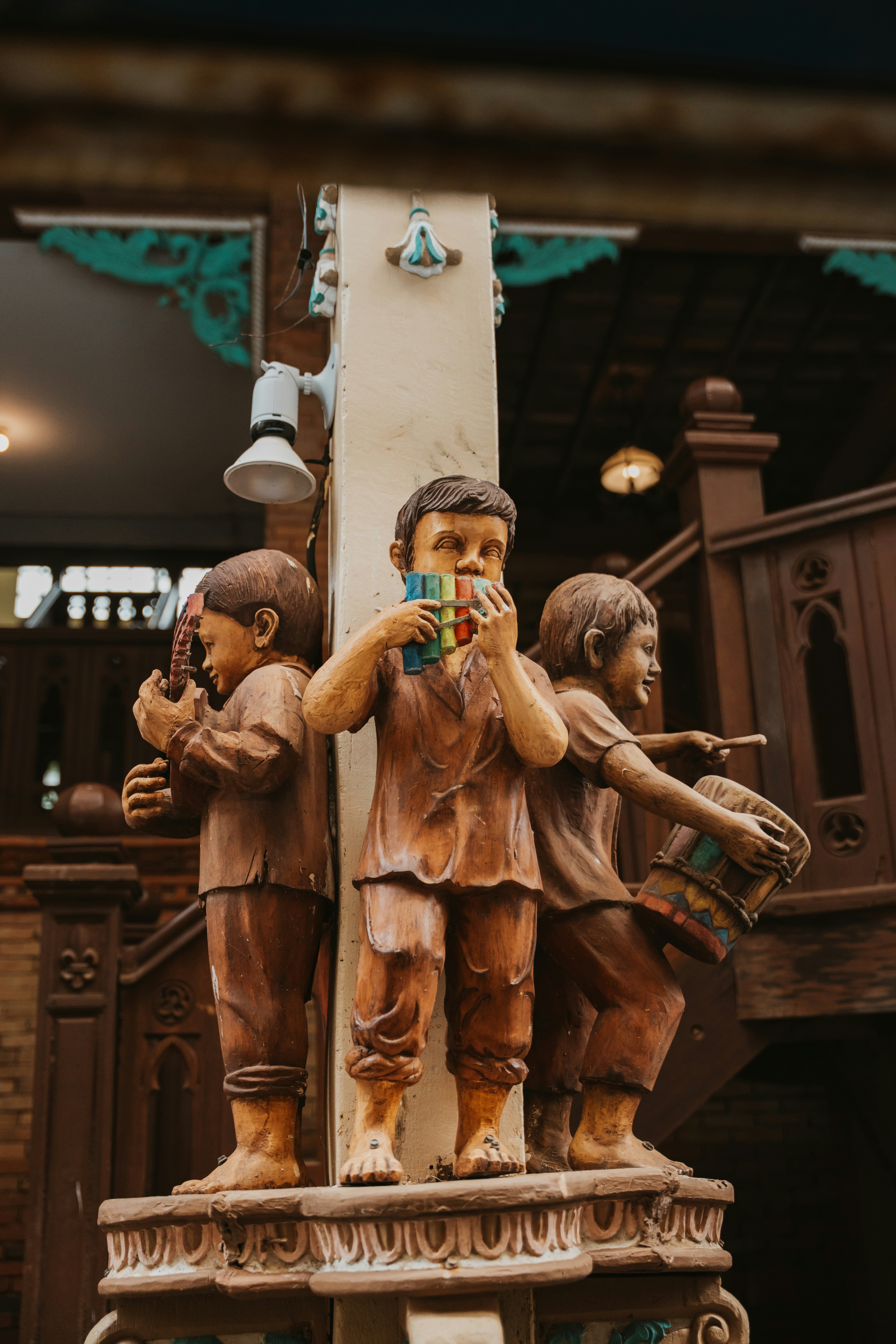 Center of Joy: Three Wooden Children as a Lodestar