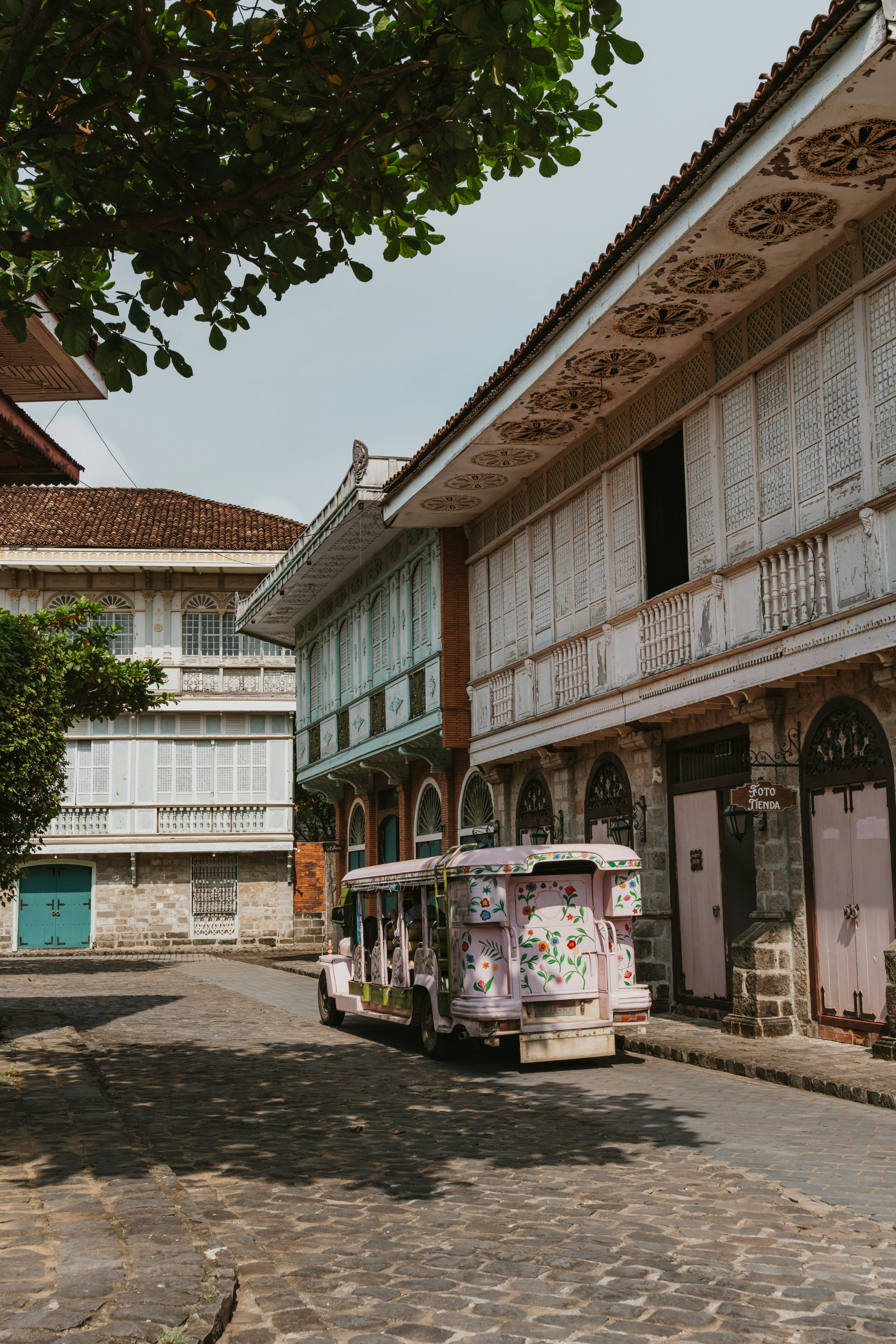 Pastel Streetcar in the Shaded Arcade