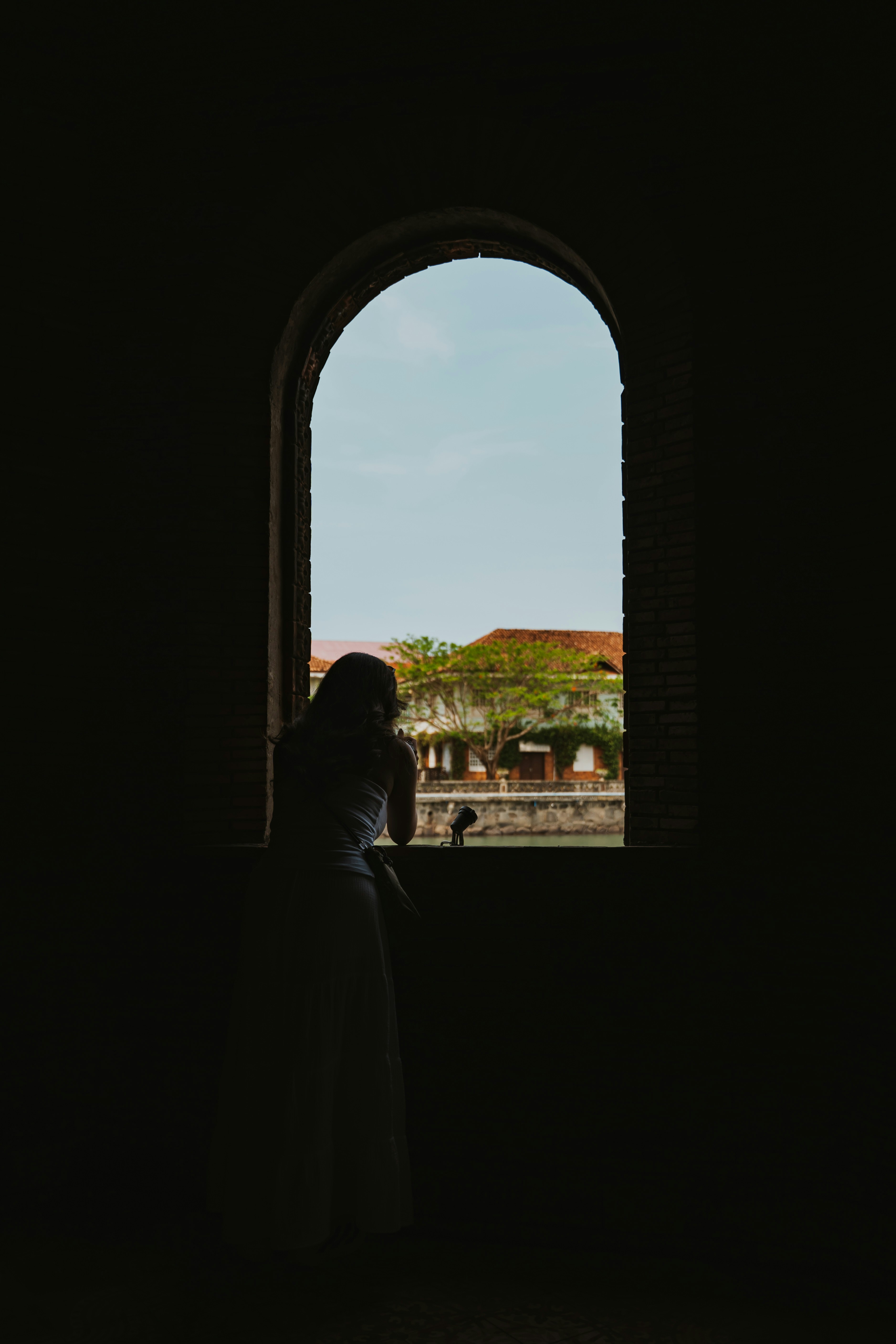 Windowed Quiet: Silhouette at the Arch