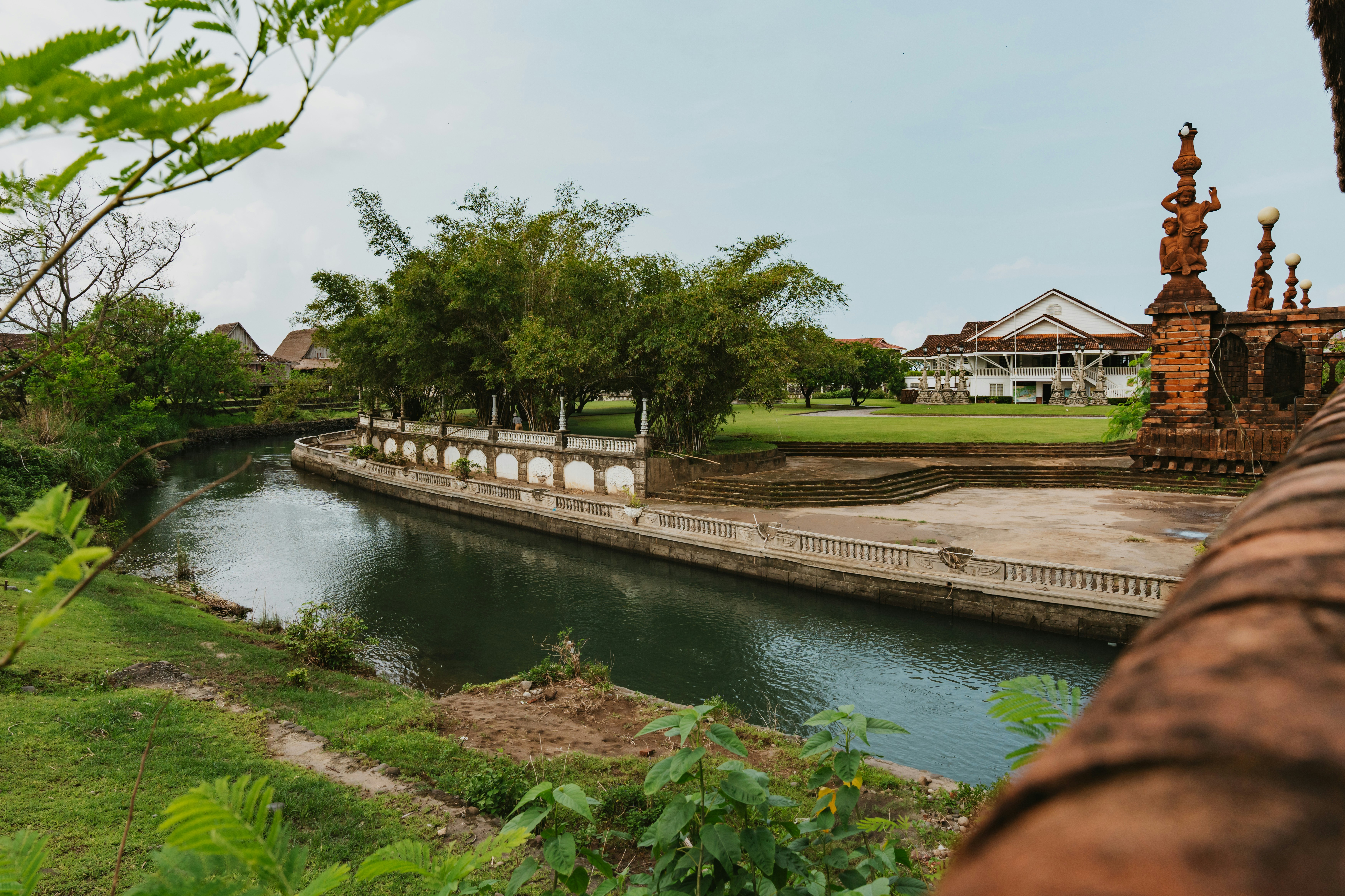 Riverside Allee and Historic Gate: A Quiet Corridor of Stone and Water