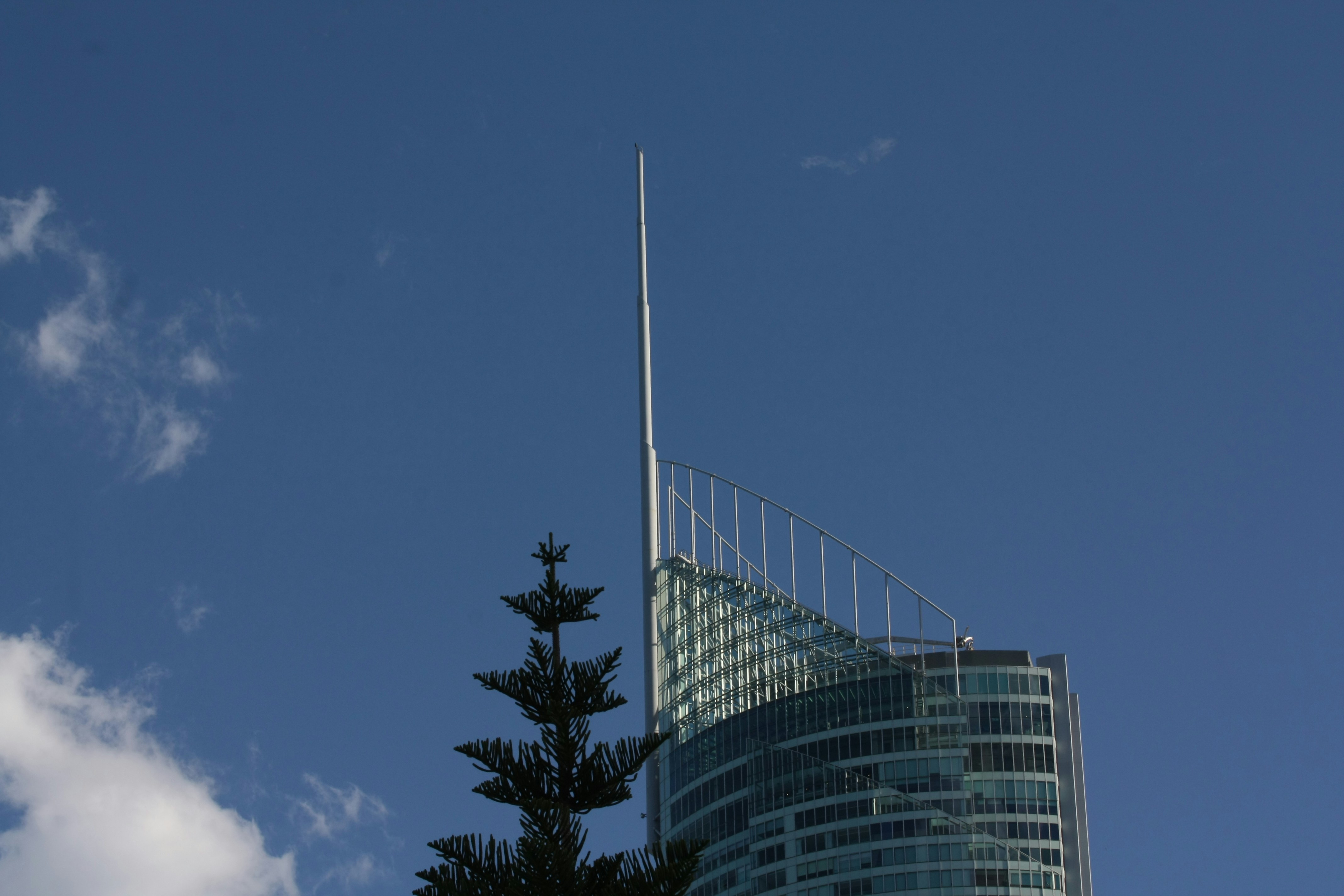 Spire and Sky: The Crown of the Modern Tower