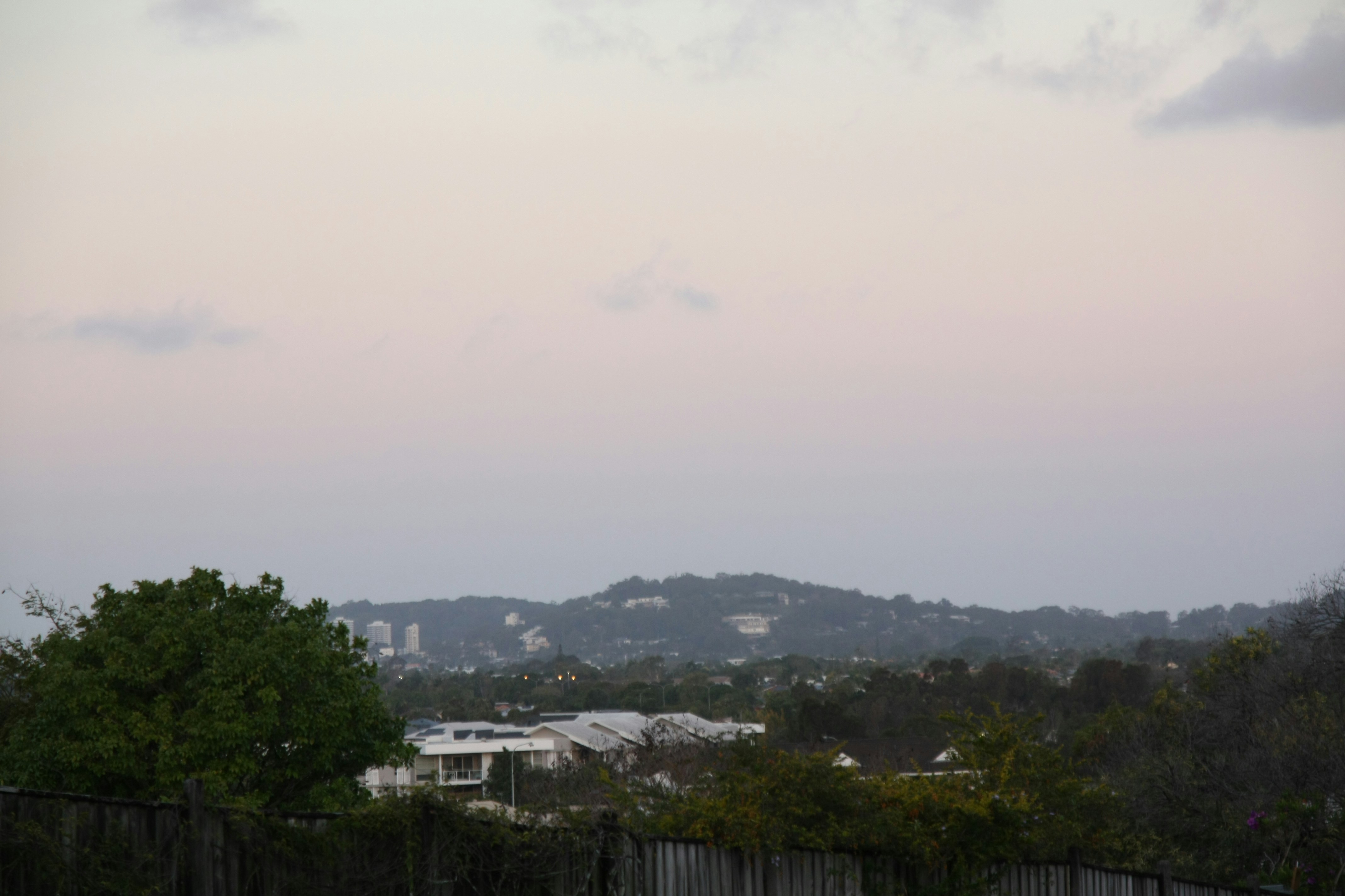Distant Hills Beneath a Soft Pacific Sky