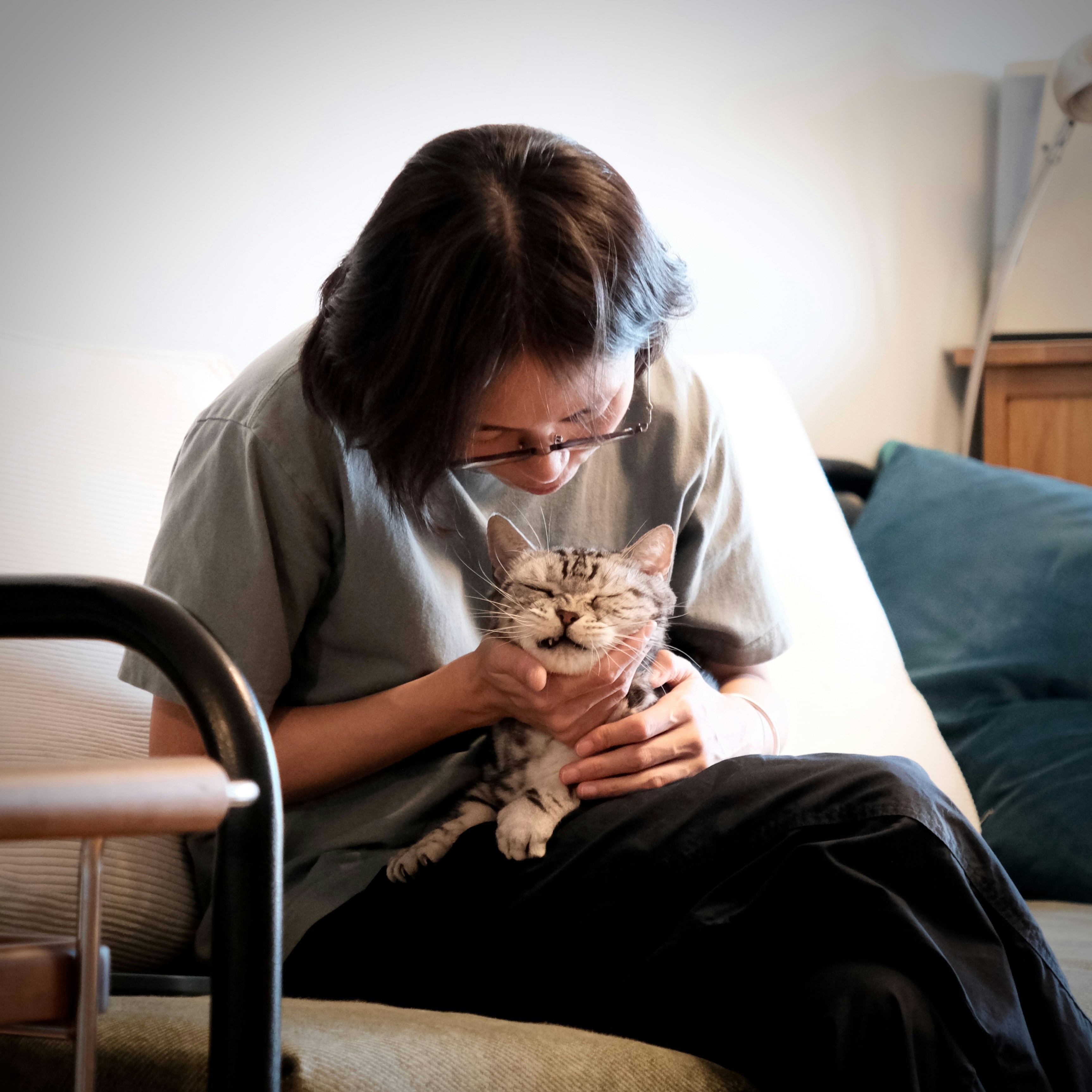 Warm Bond: A Quiet Moment Between Person and Cat
