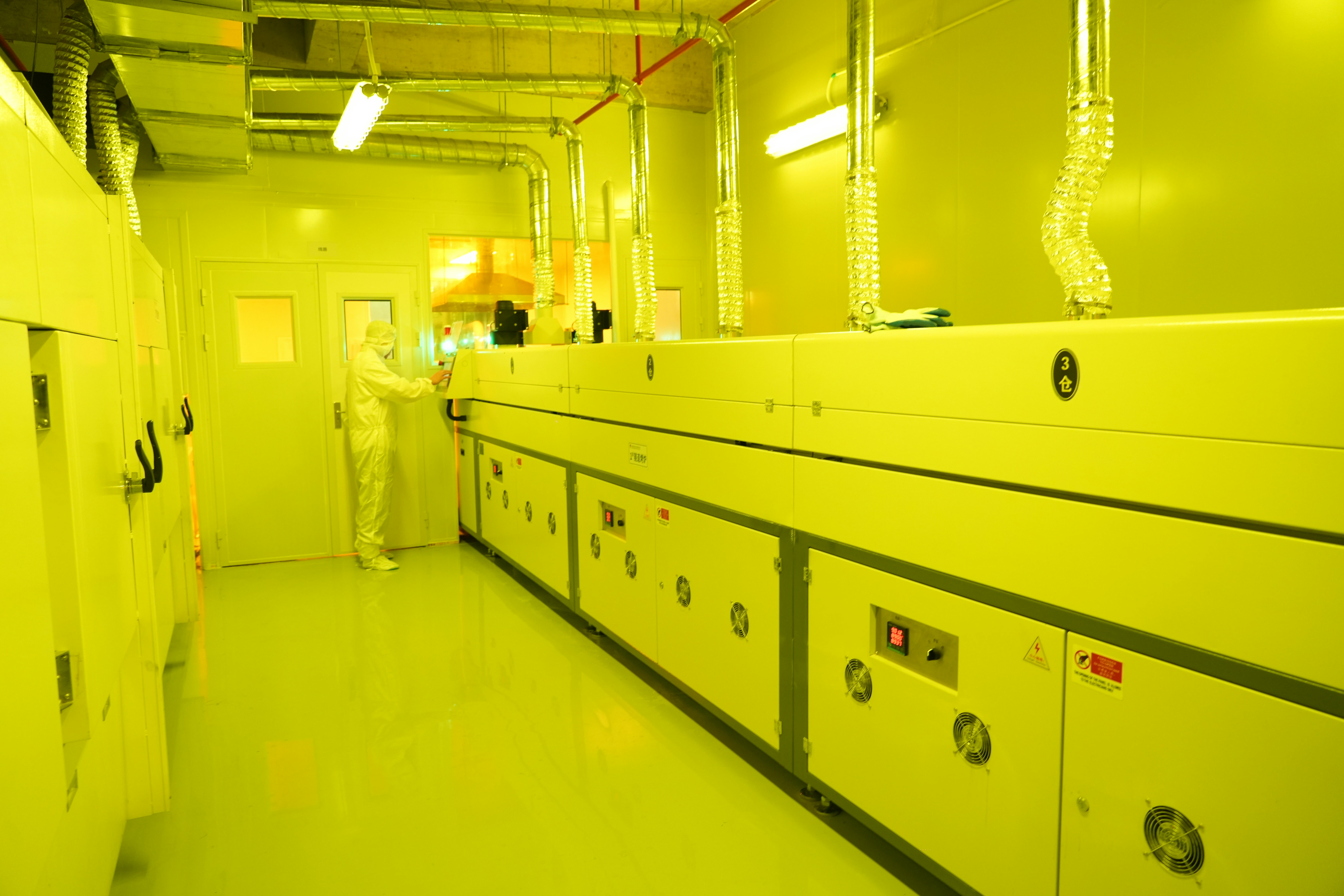 Yellow Corridor of Precision: Lab Row with Operators