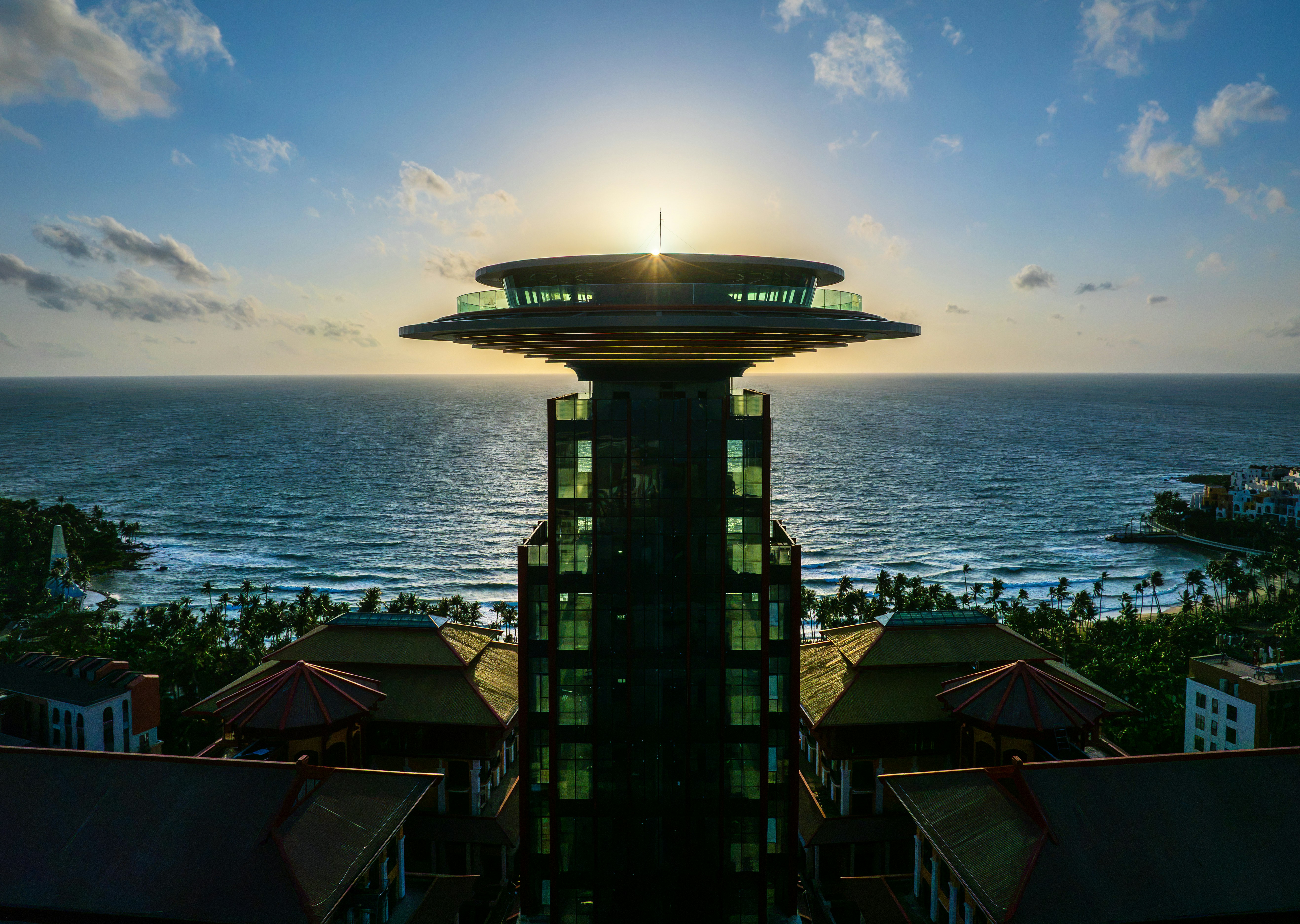 Sun-Crowned Observatory: A Cliffside Oasis Framing the Ocean Horizon