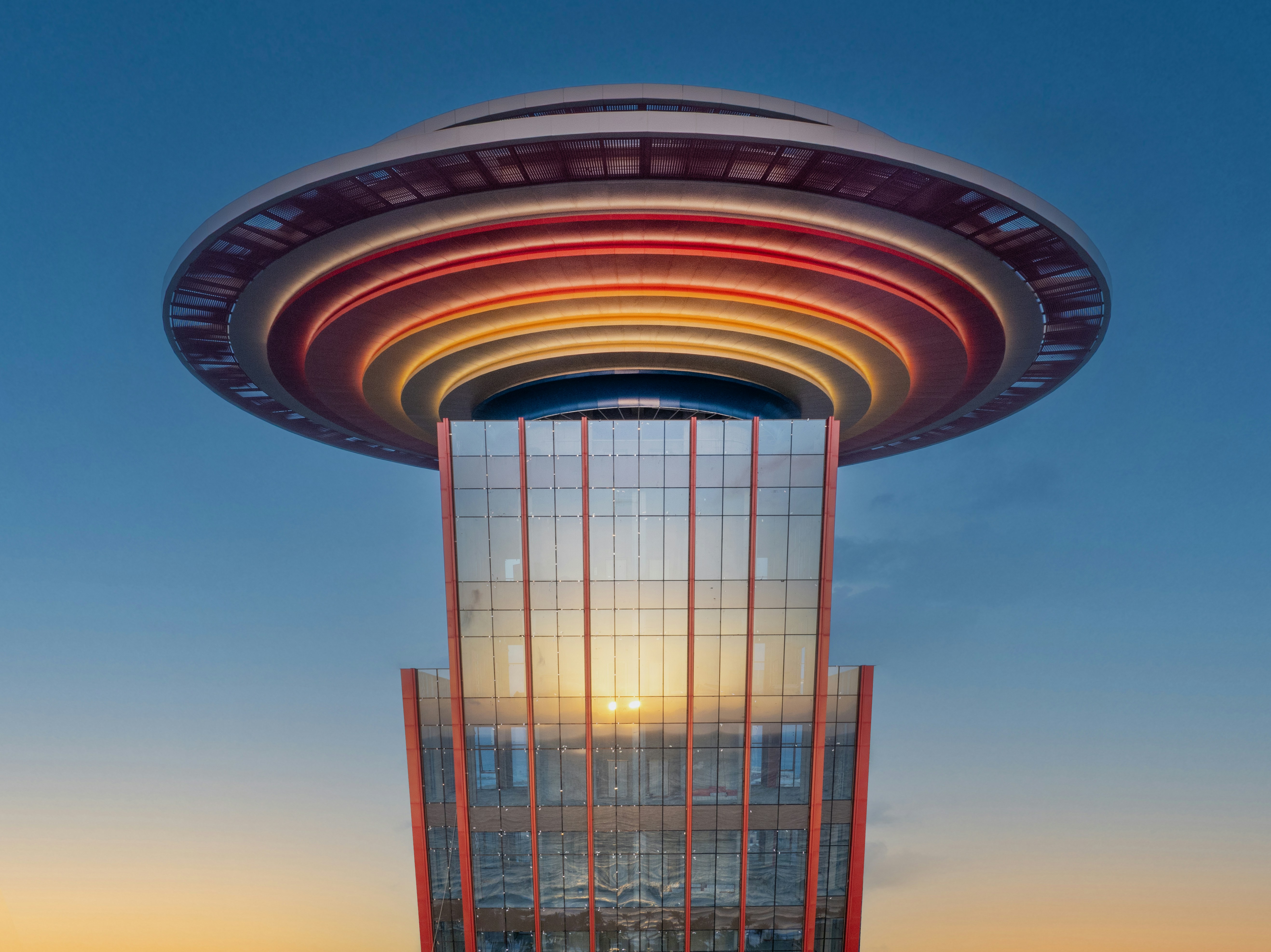 Lightring Tower: A Sunset Ascension Under a Neon Disk