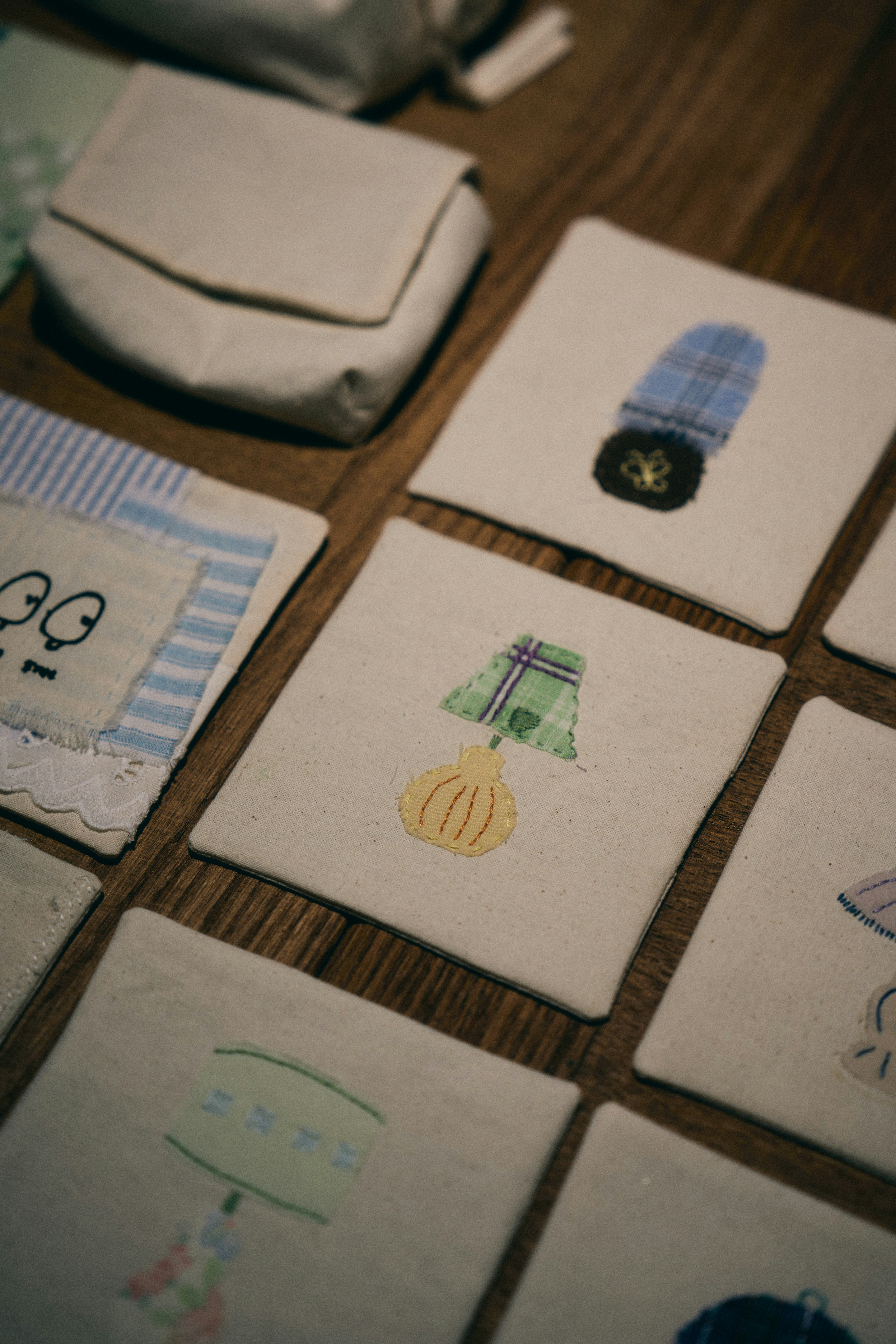 Tiny Art Tiles: A Patchwork of Whimsical Weaves