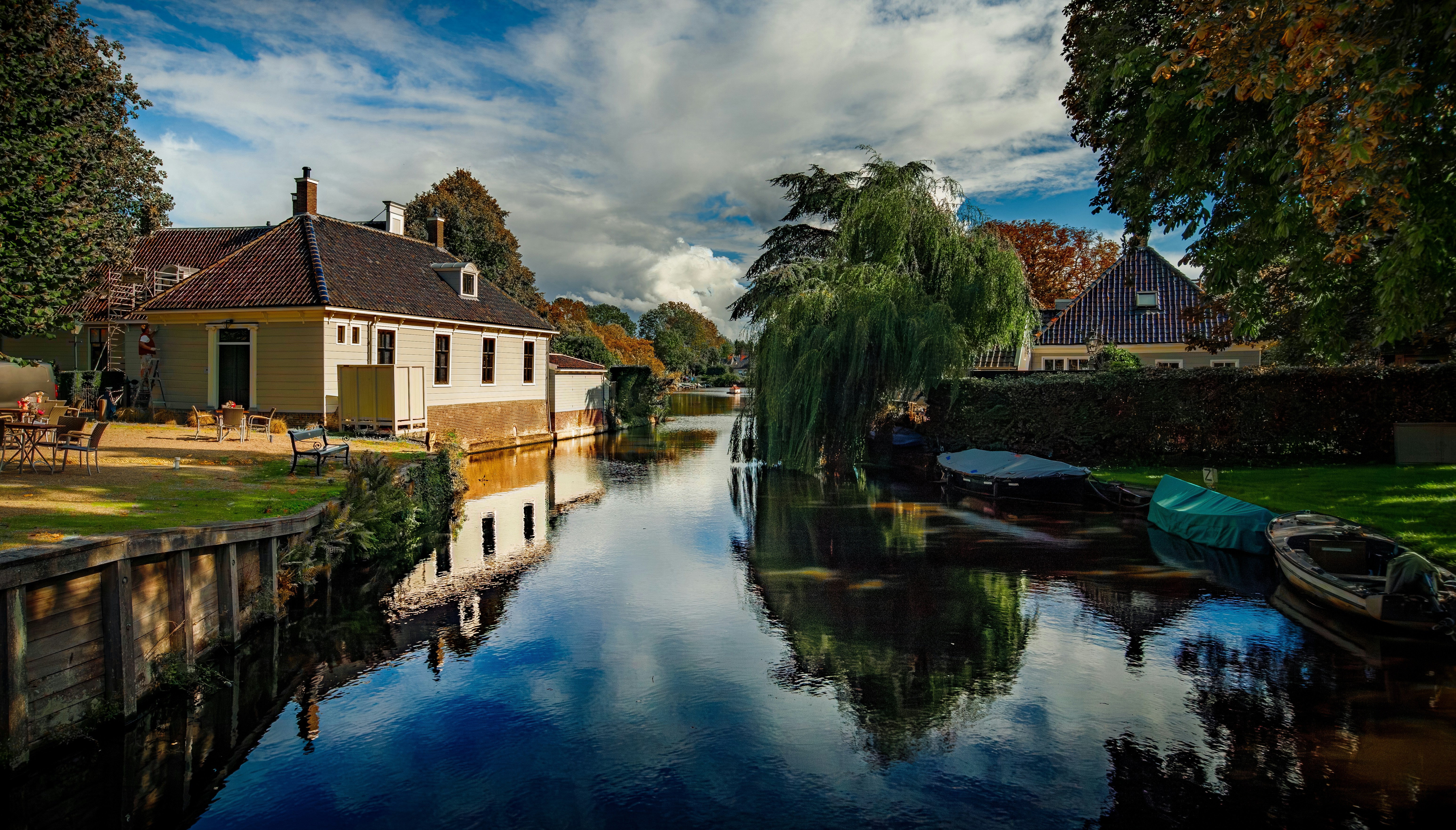 Canal Reflections: A Quiet Village Between Sky and Water