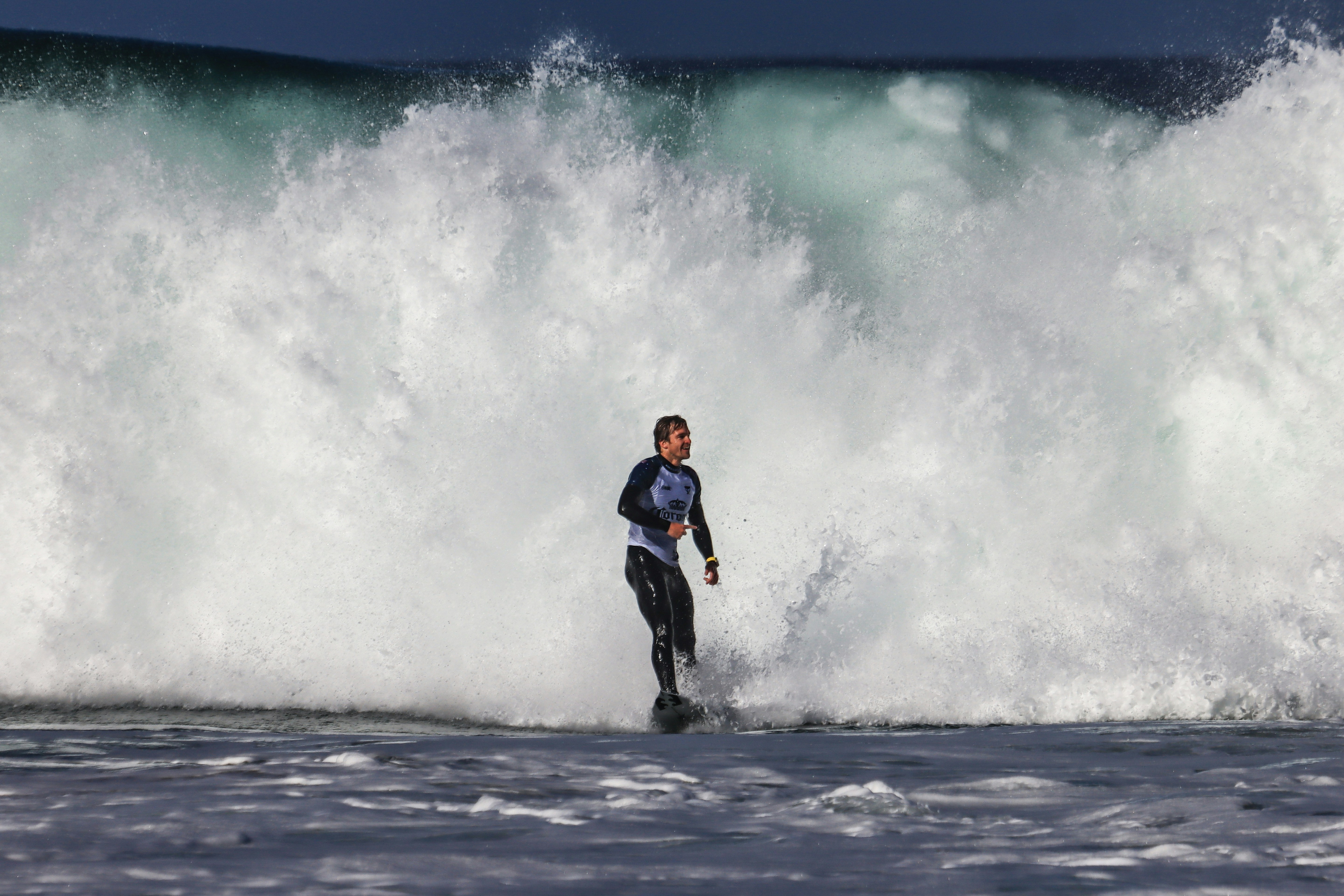 Rider Confronts a Wall of Spray: Surf in the Break
