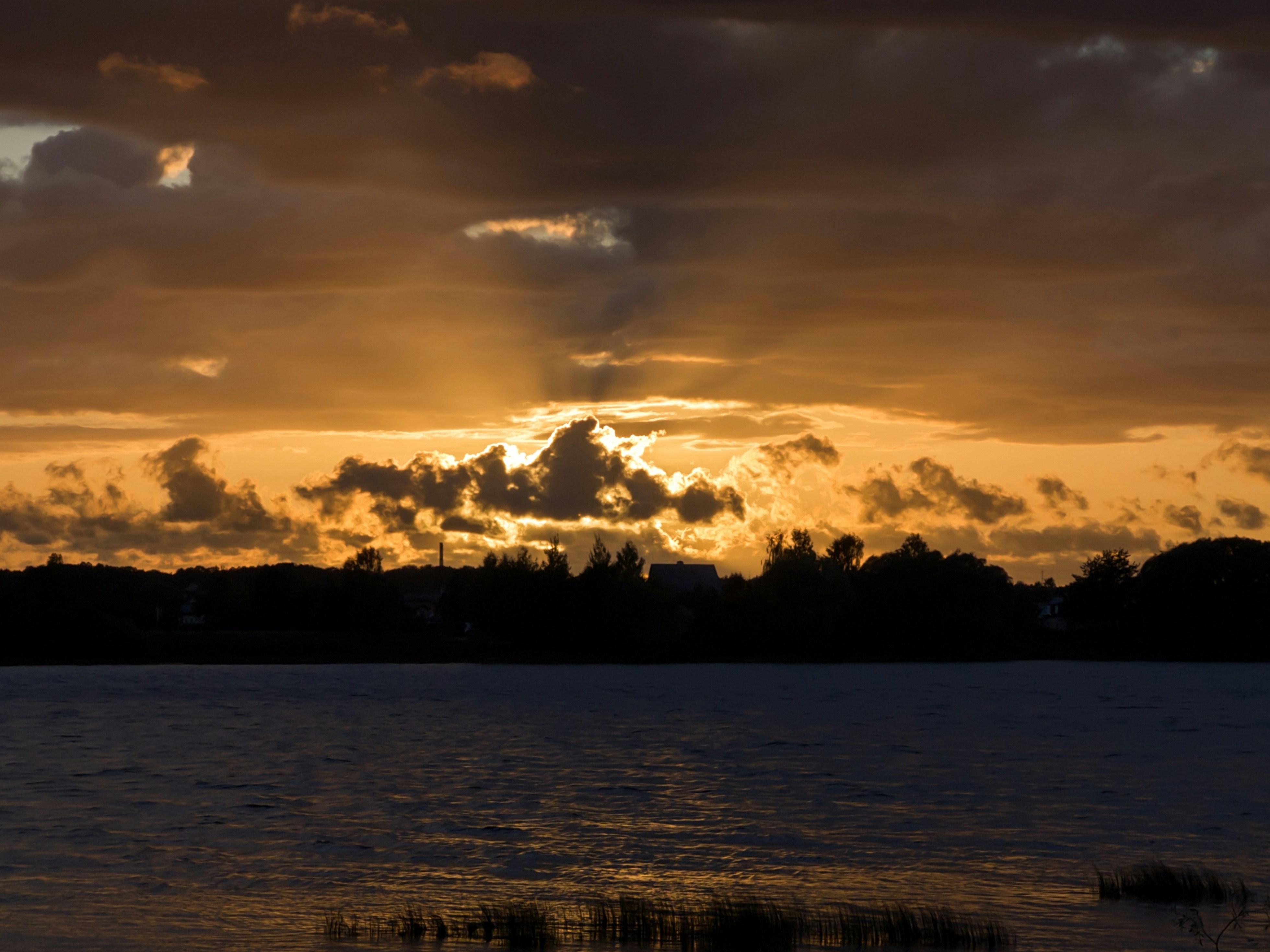 Golden Horizon over Quiet Water