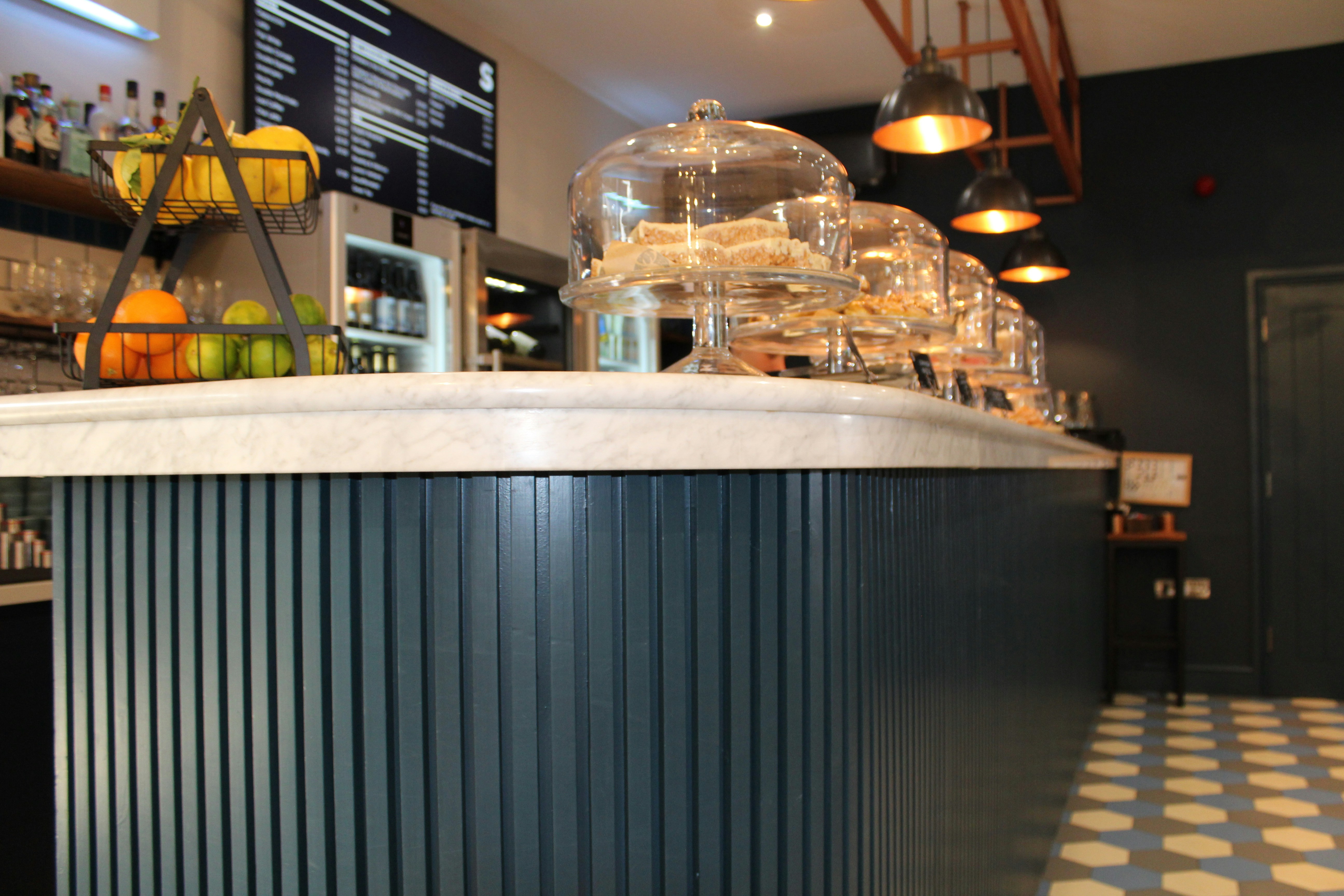 Glass Domes and Coffee Counter: Quiet Cafe Geometry