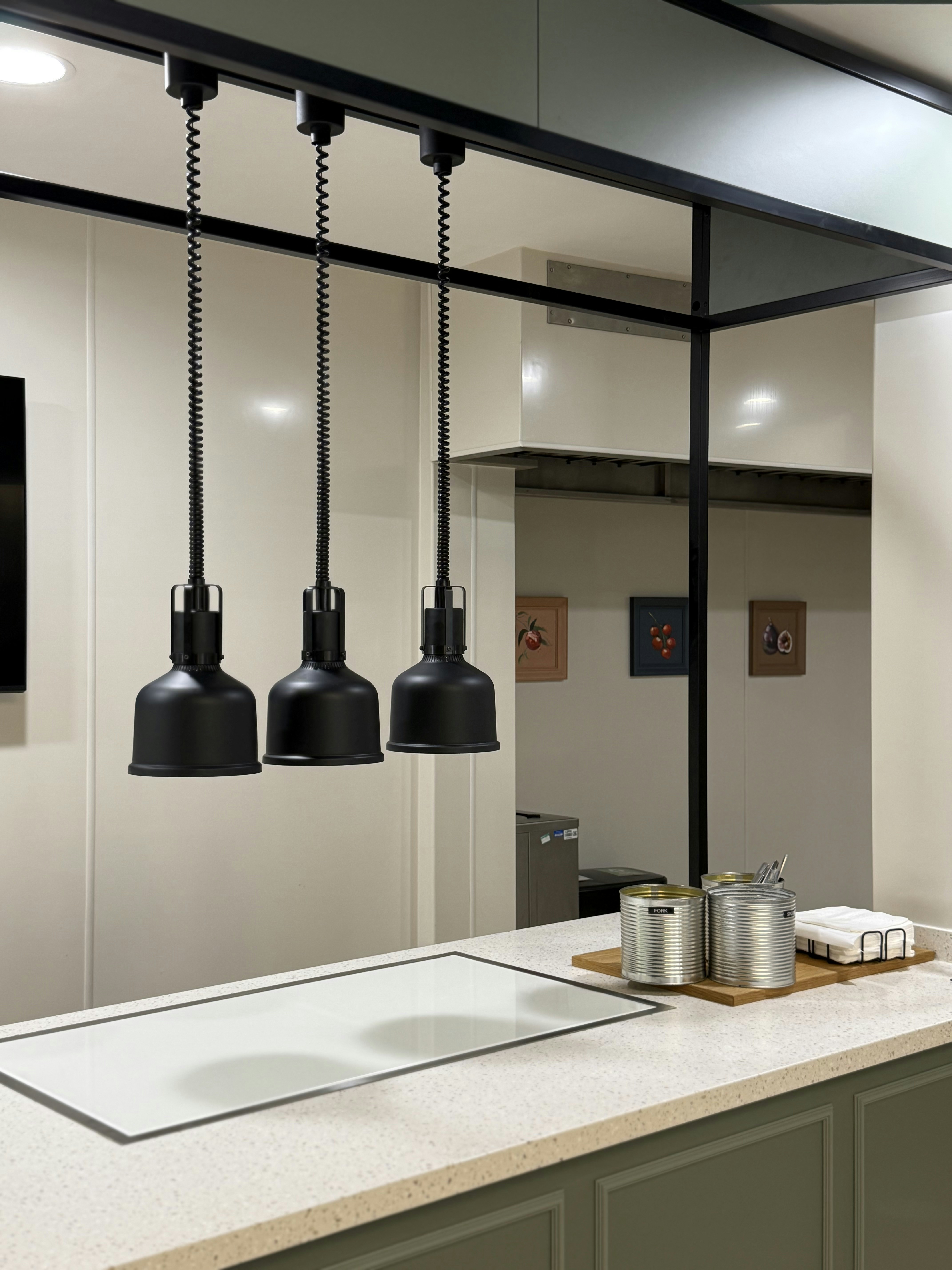 Industrial Pendant Lights Over a Minimal Kitchen Island