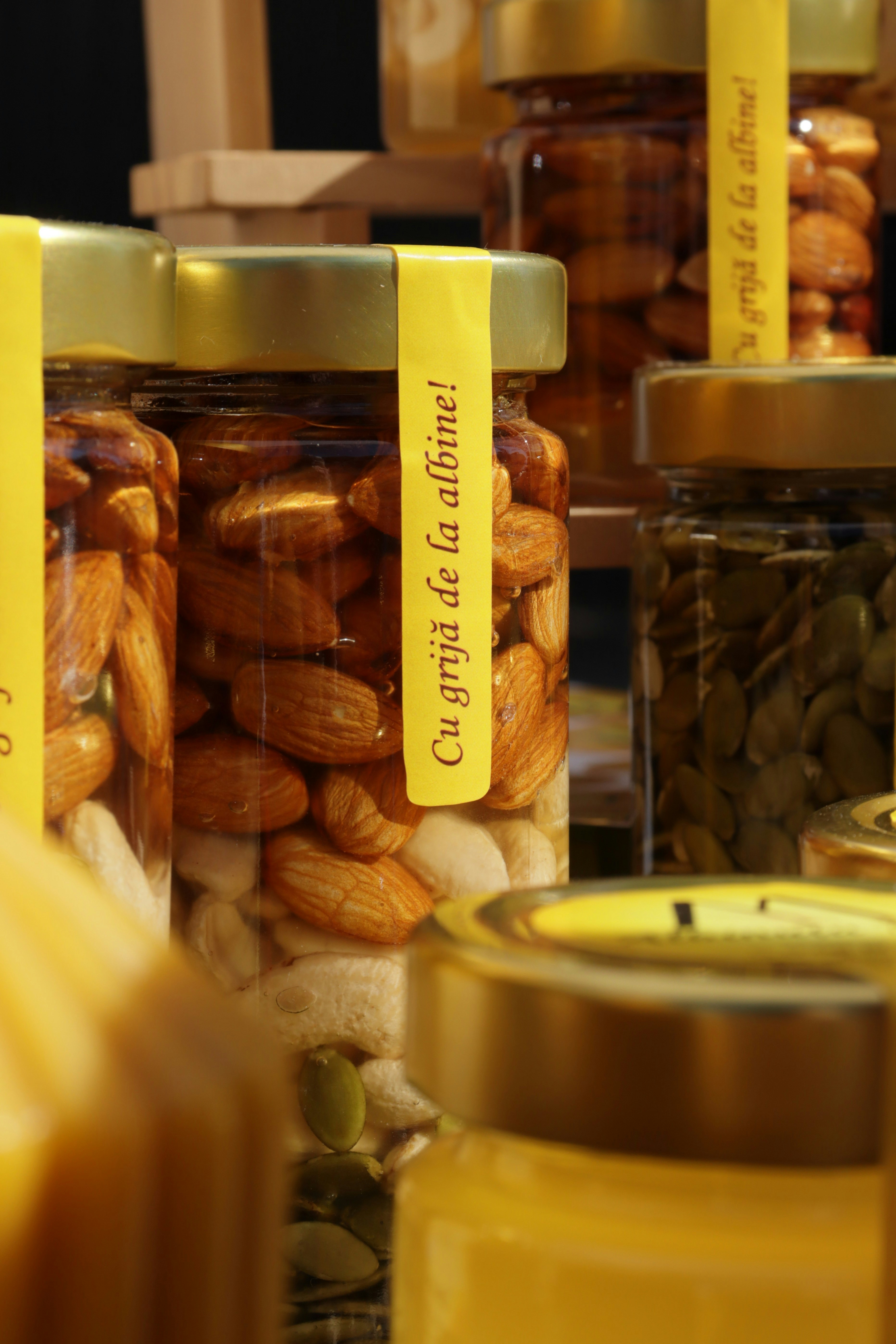Amber-Glazed Jars: A Close View into a Nut-Packed Display