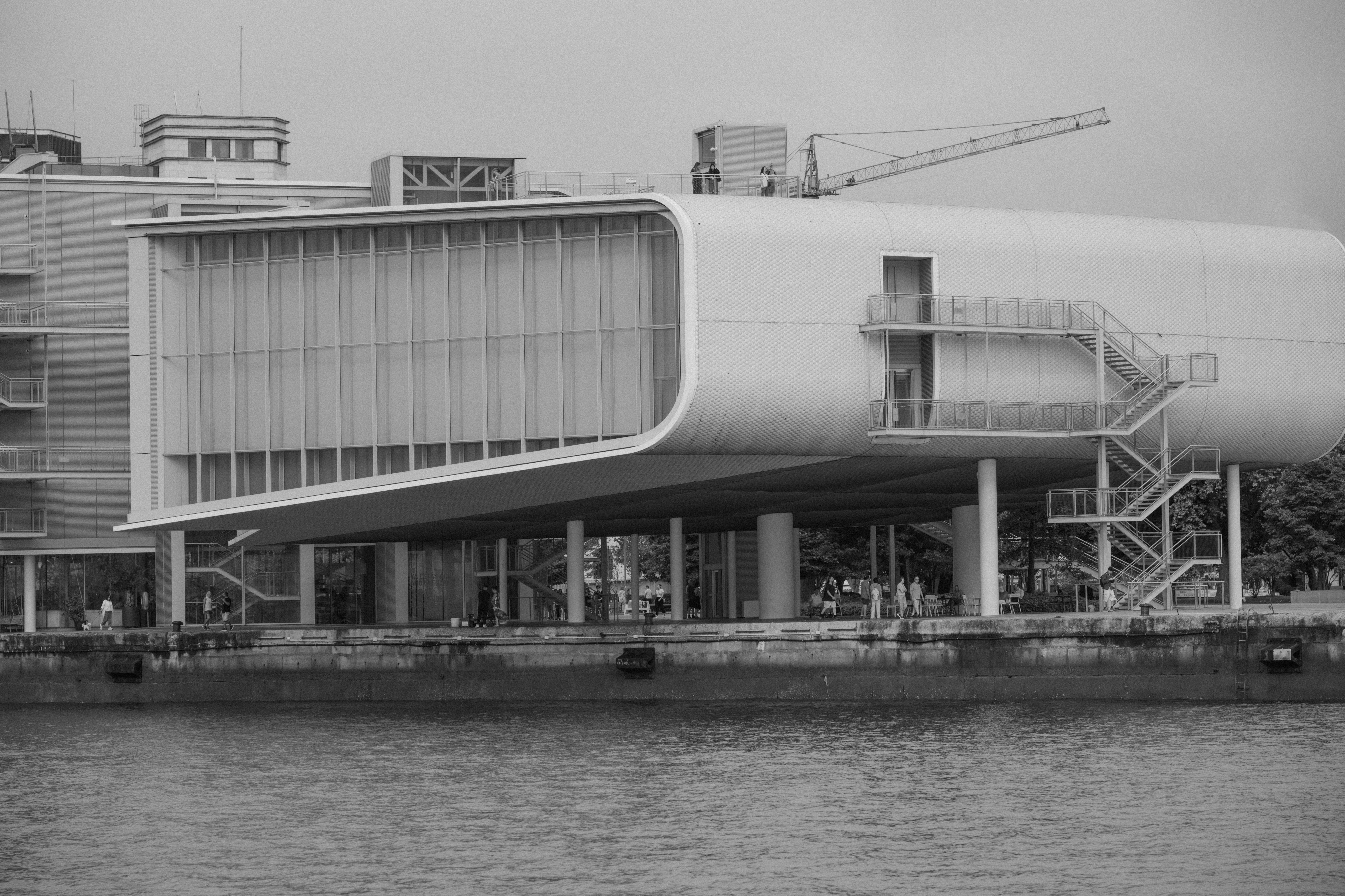 Floating Modernism: The Waterfront Annex</br>Detail of a futuristic riverside building on stilts