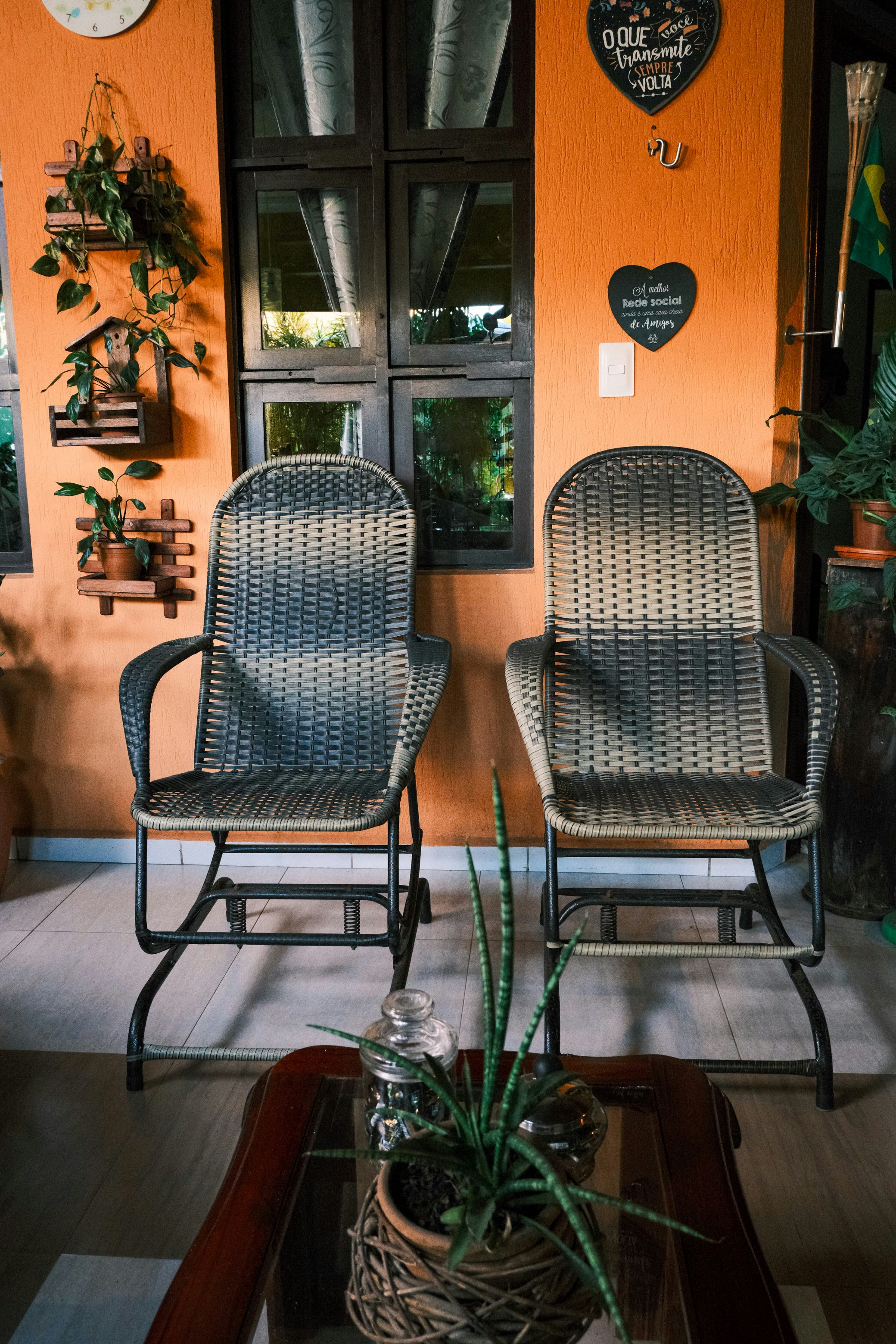 Retreat on a Terrace: Wicker Chairs and a Verdant Corner