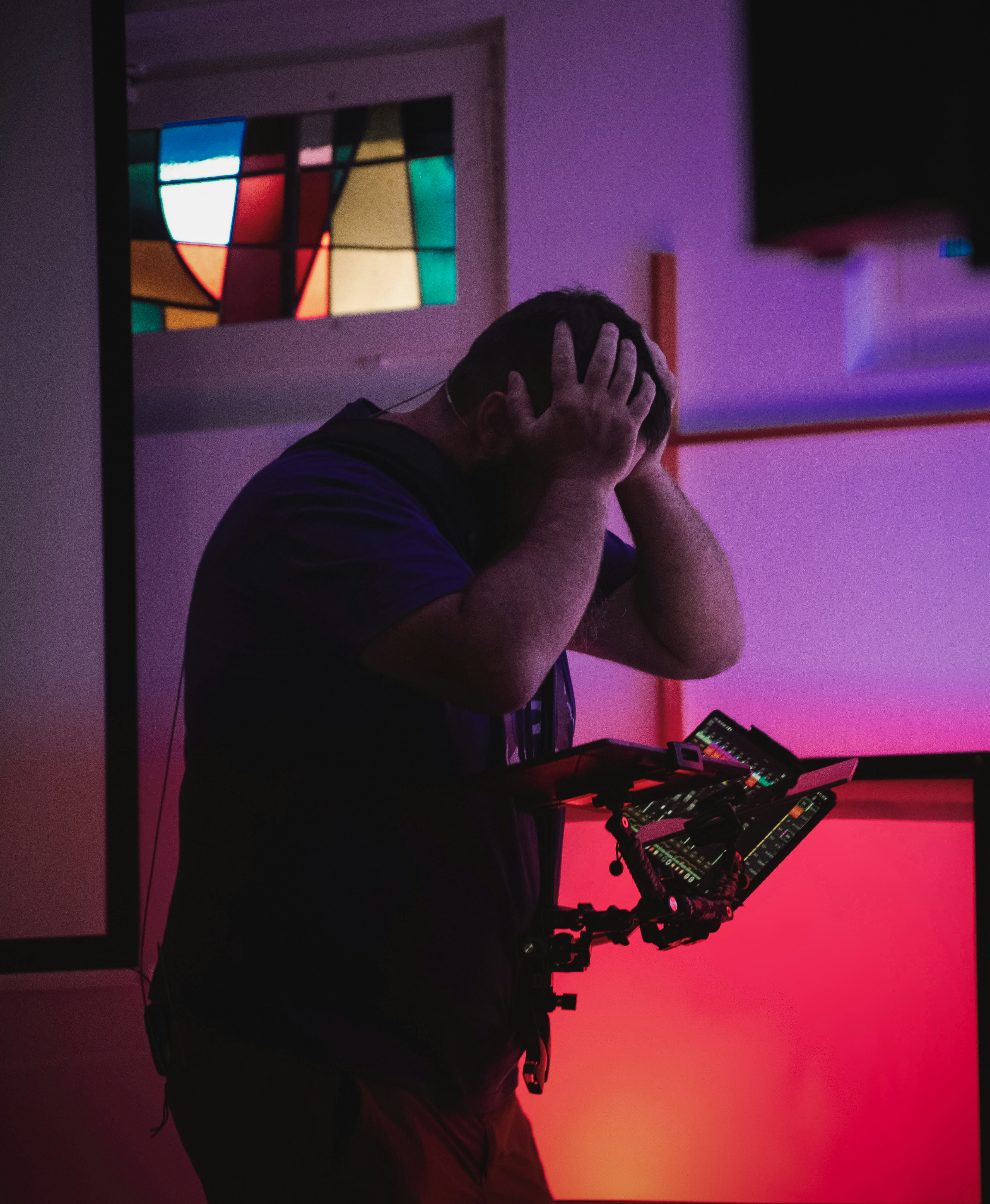 Shadows and Signals: A Filmmaker Reels Under Neon Hue