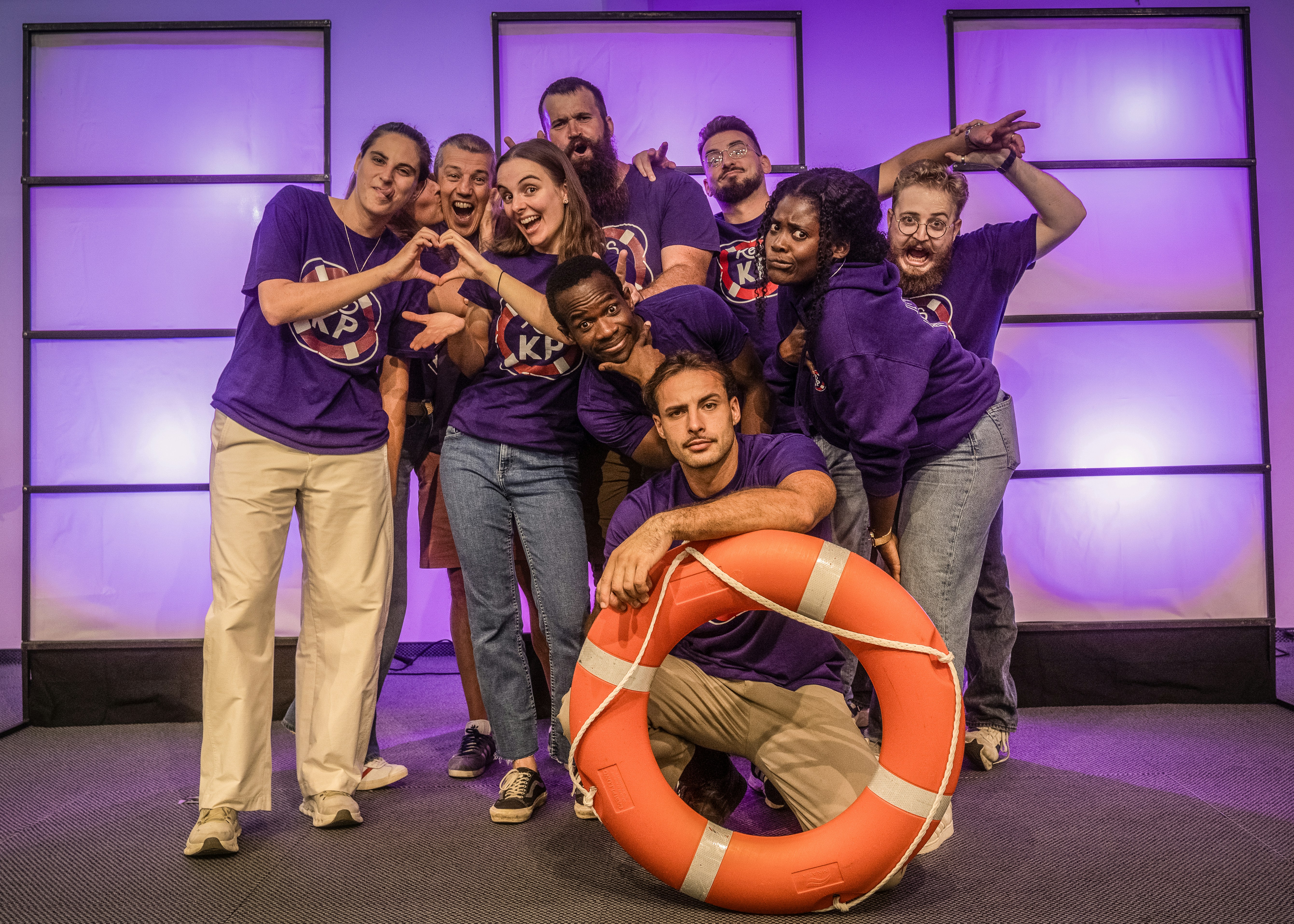 Team Purple: A Playful Pose with Life-Saving Ring