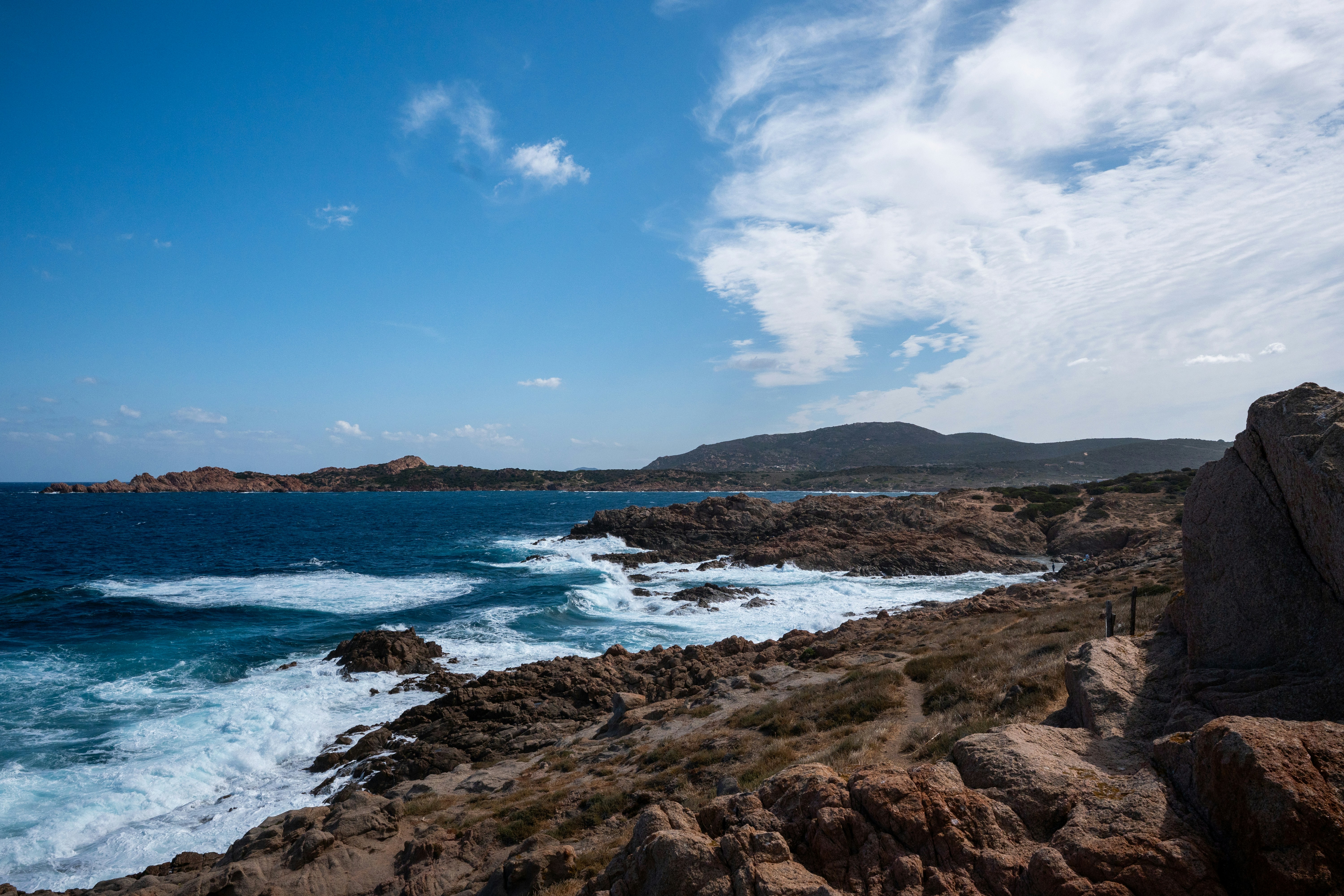 Rugged Coastline under a Wide Sky