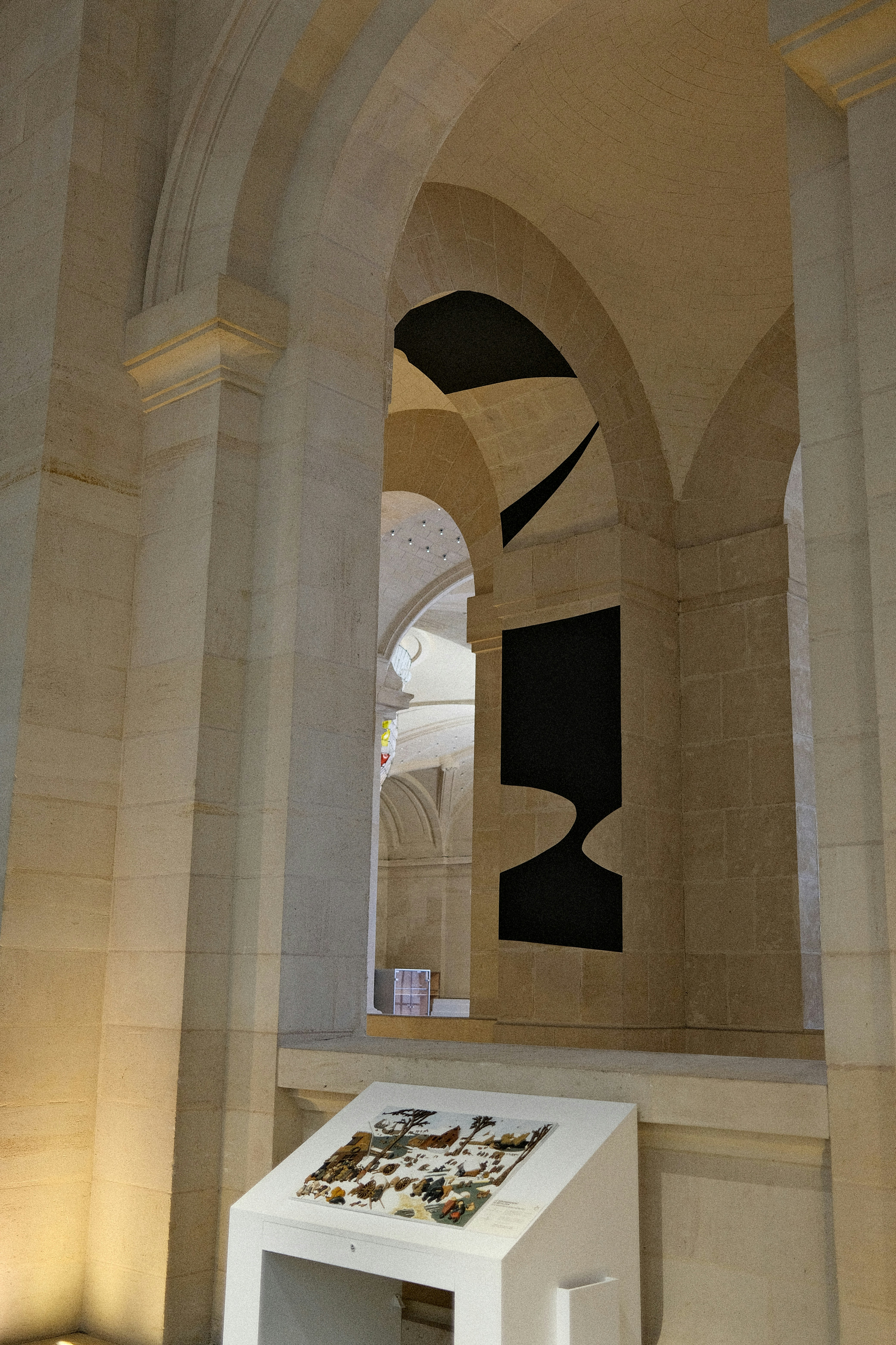 Stone Arches and Abstract Light: An Interior Gallery of Geometry