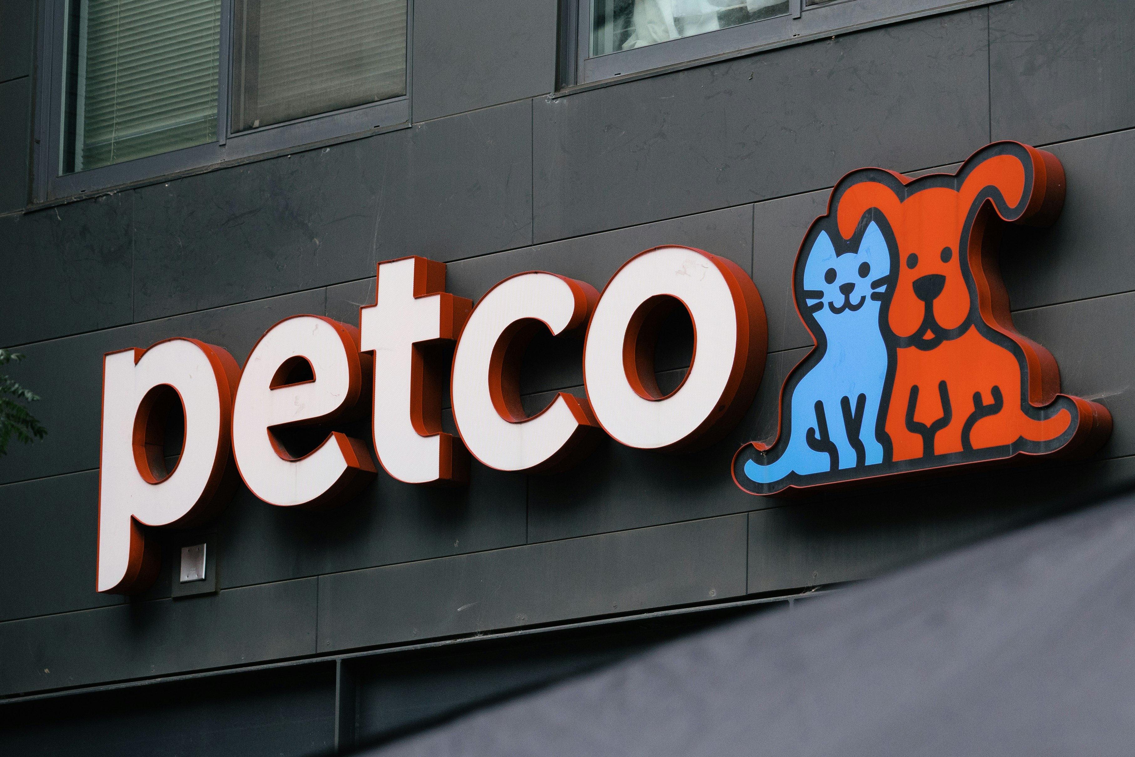 Petco Signage with Playful Cats Emblem