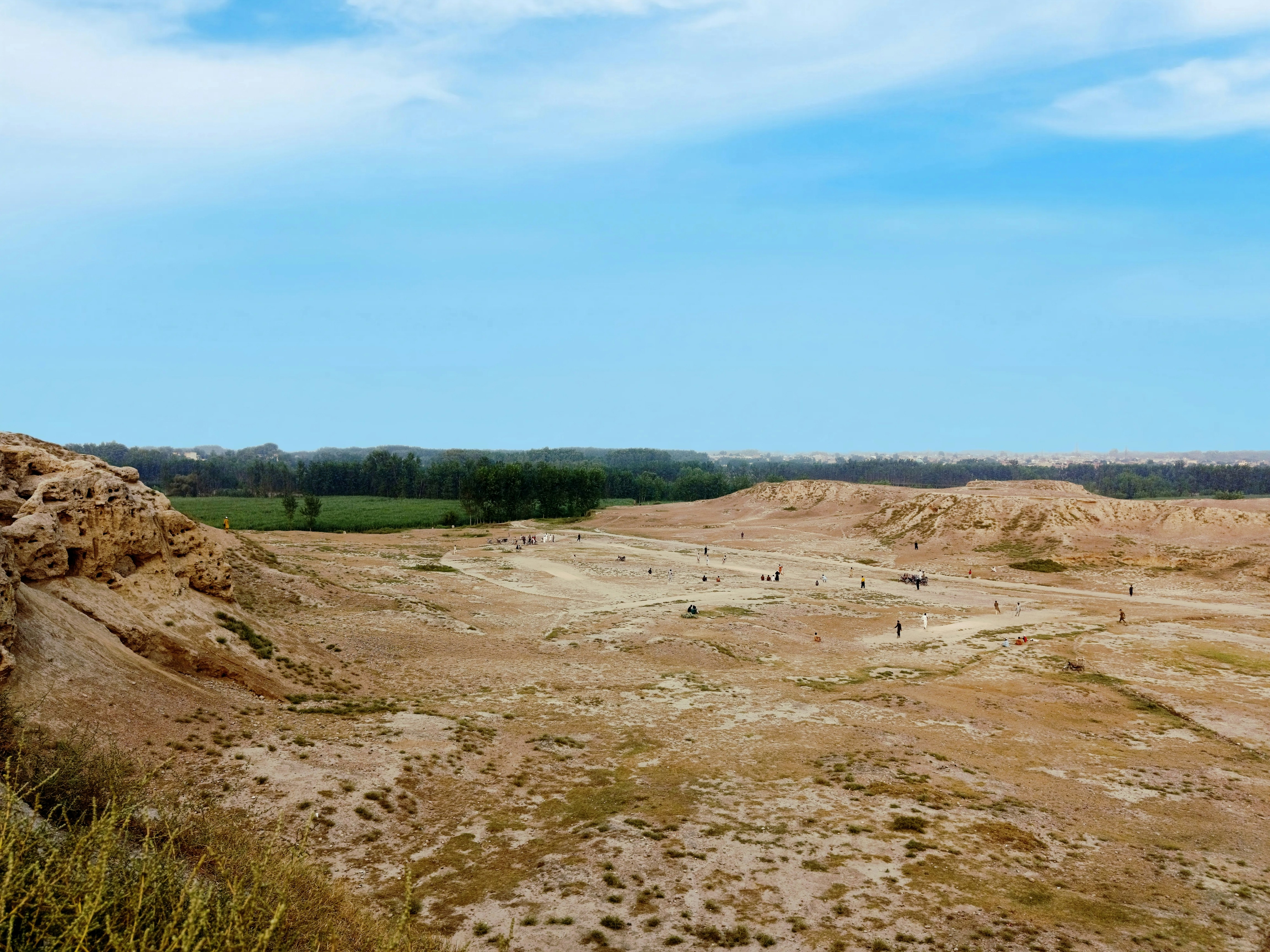 Wind-Swept Excavation Field under a Clear Sky