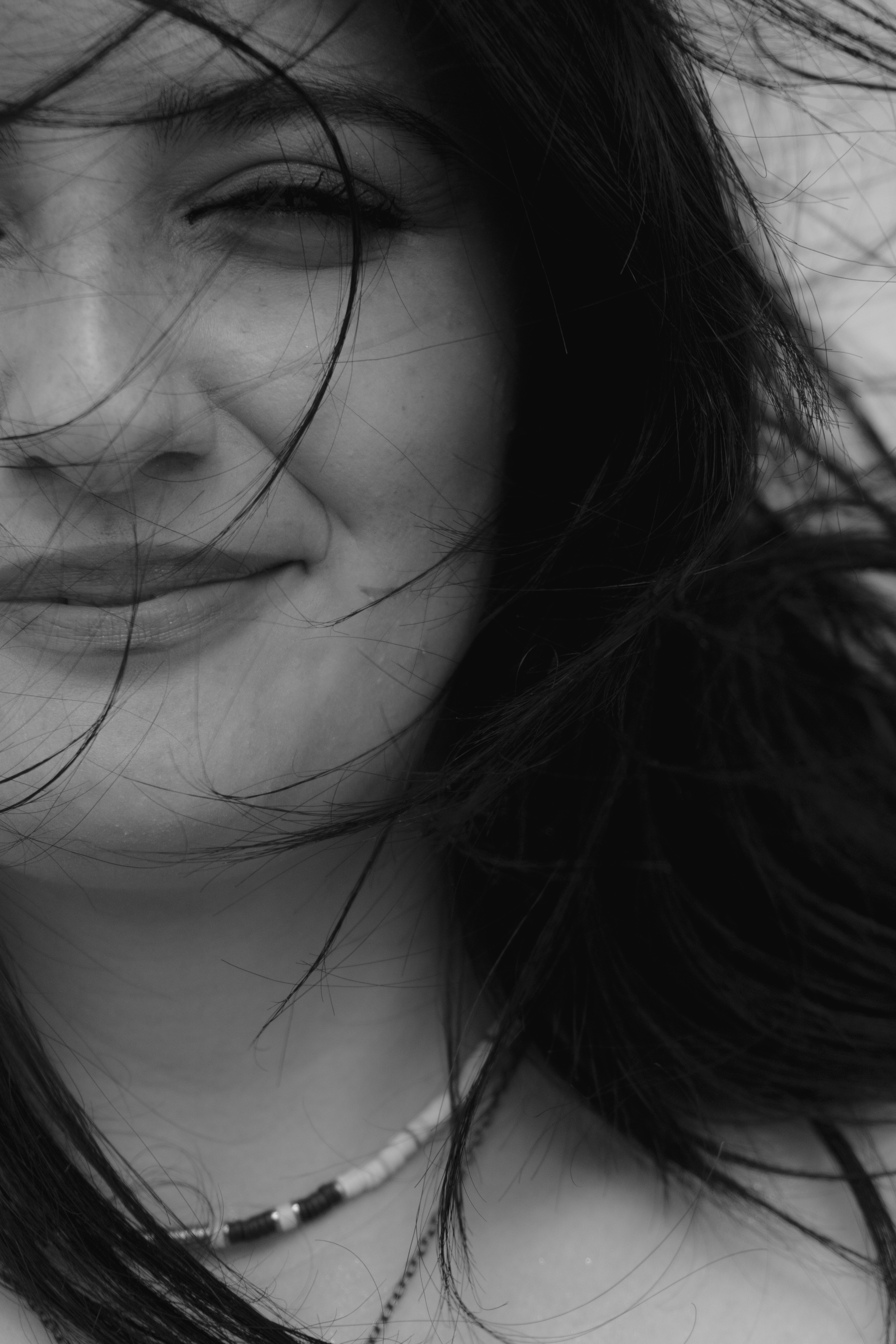 Half-visible Smile, Half-wind-swept Portrait