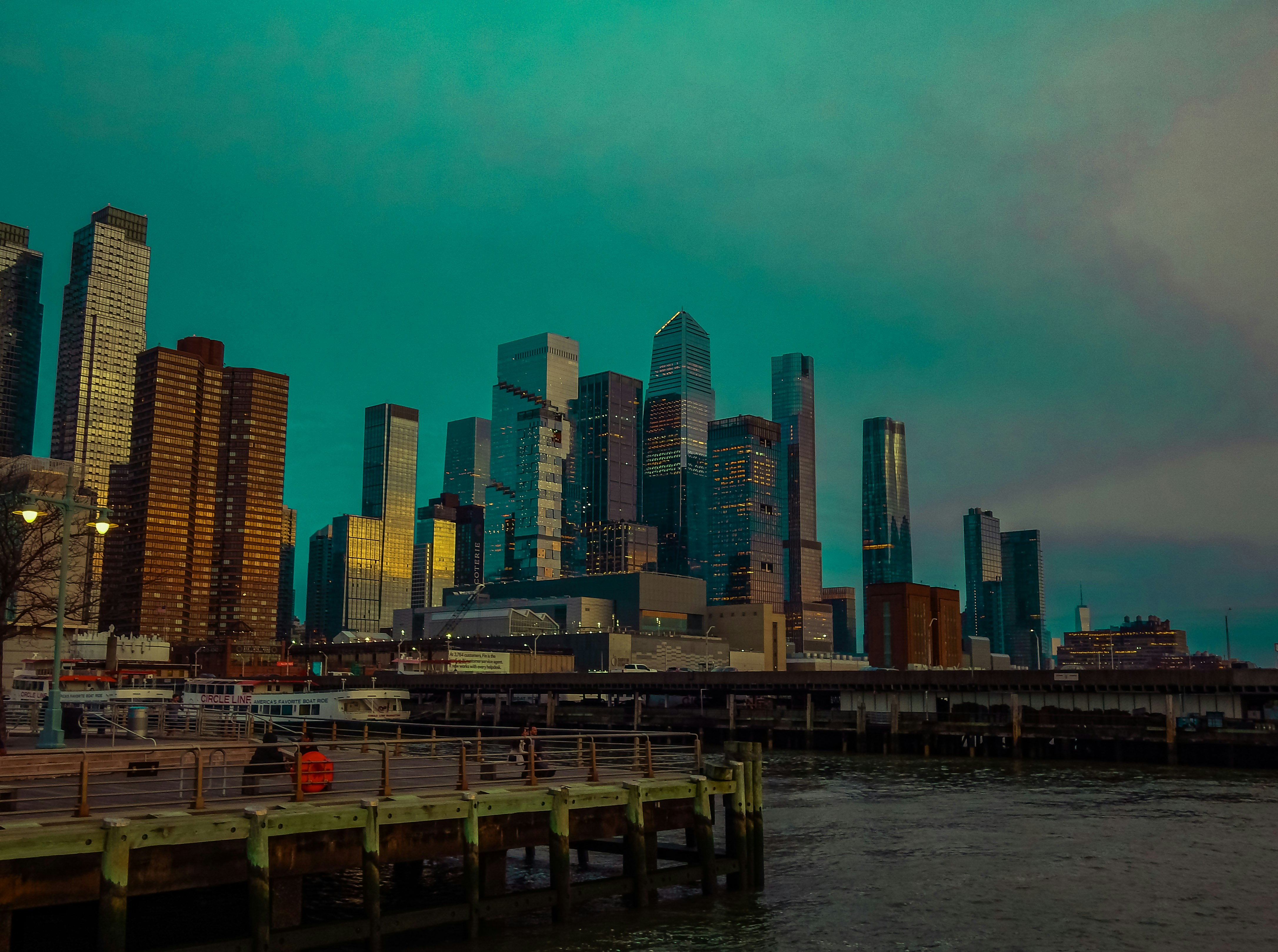 City Skyline Over Quiet Waterfront at Dusk