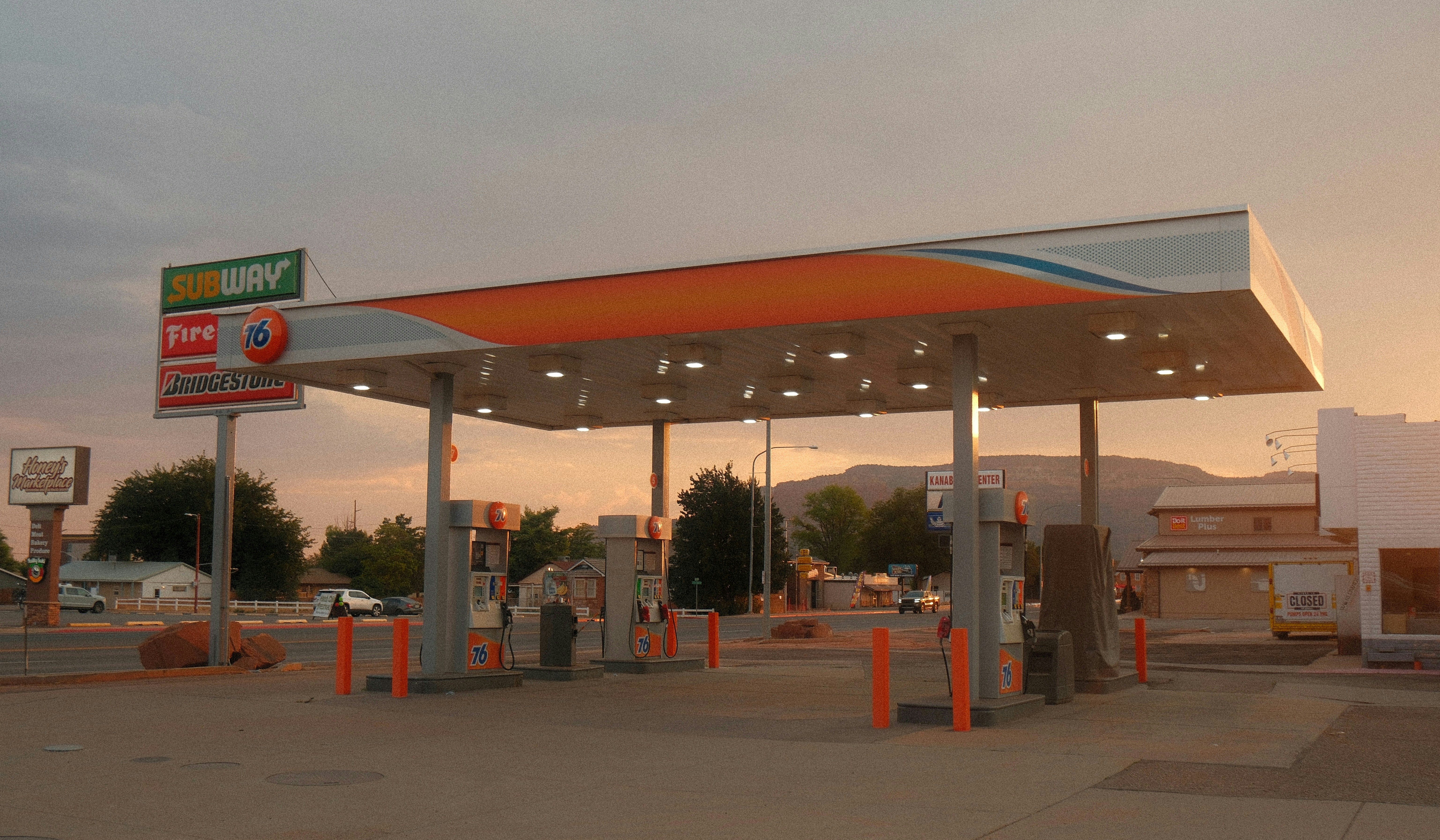 Quiet Sunset at a Standalone Gas Station