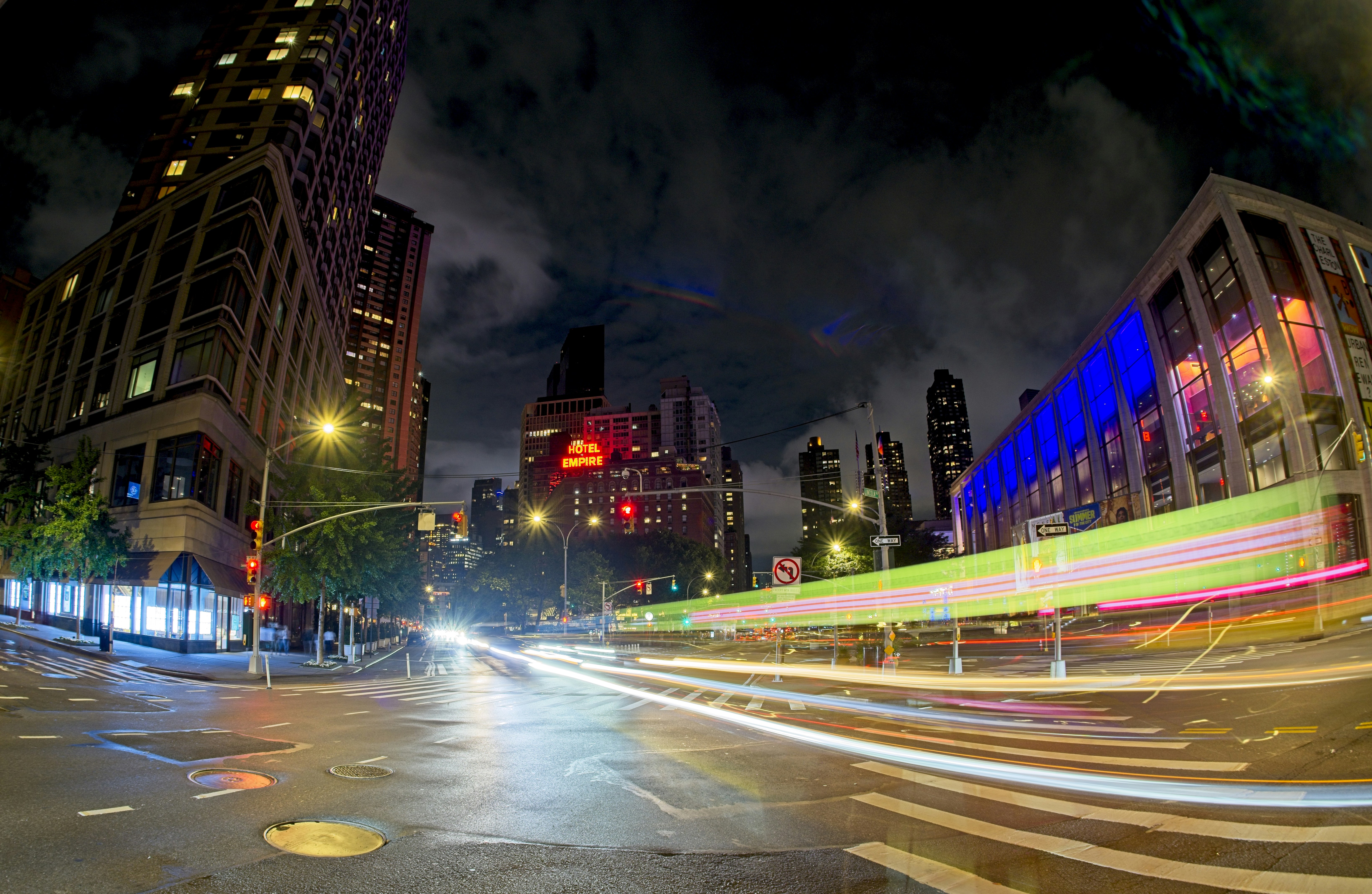 Neon Veil Over Downtown: A Nighttime Light-Trace of Move and Momentum