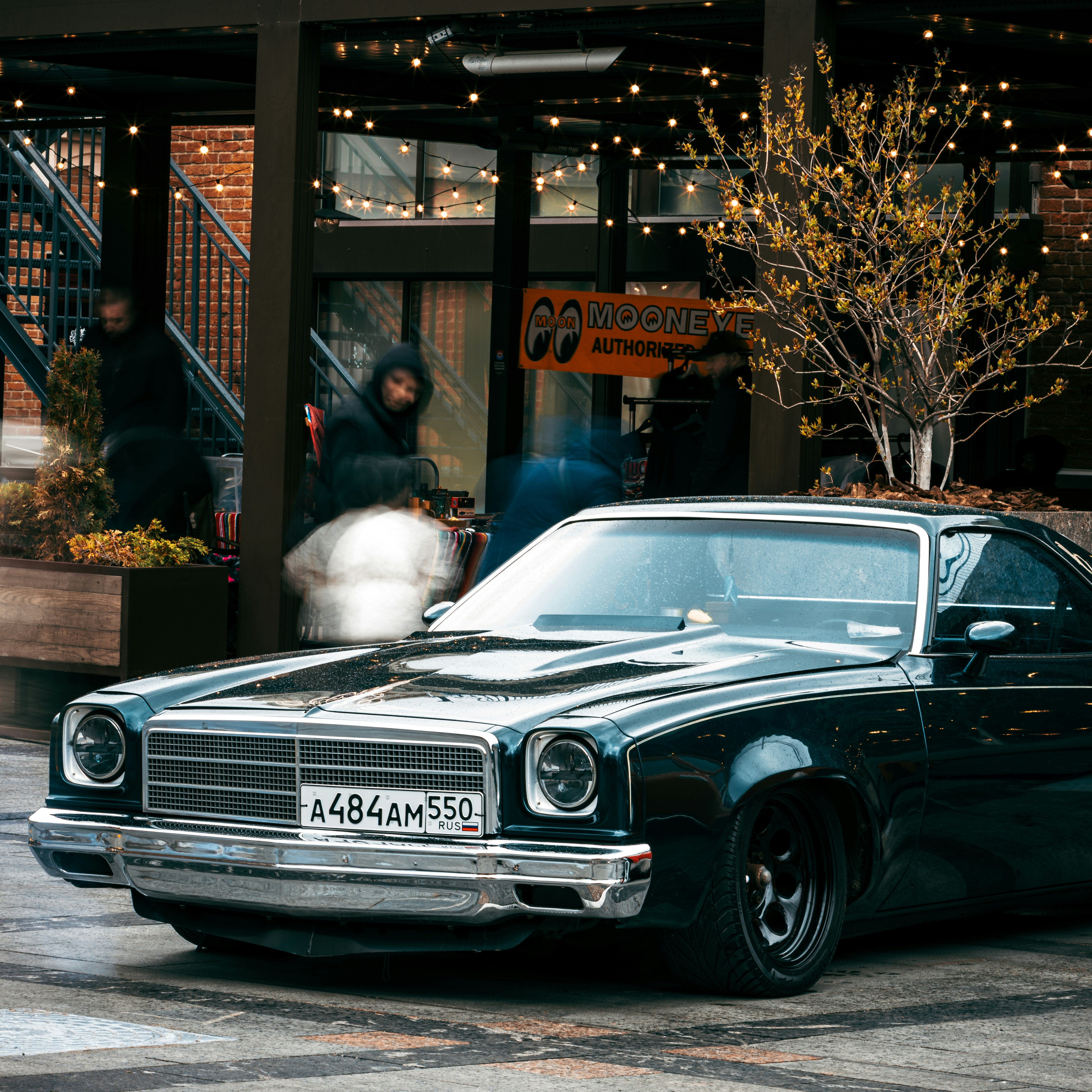 Classic Cadillac on a City Street: Chrome, Curves, and Night Pop