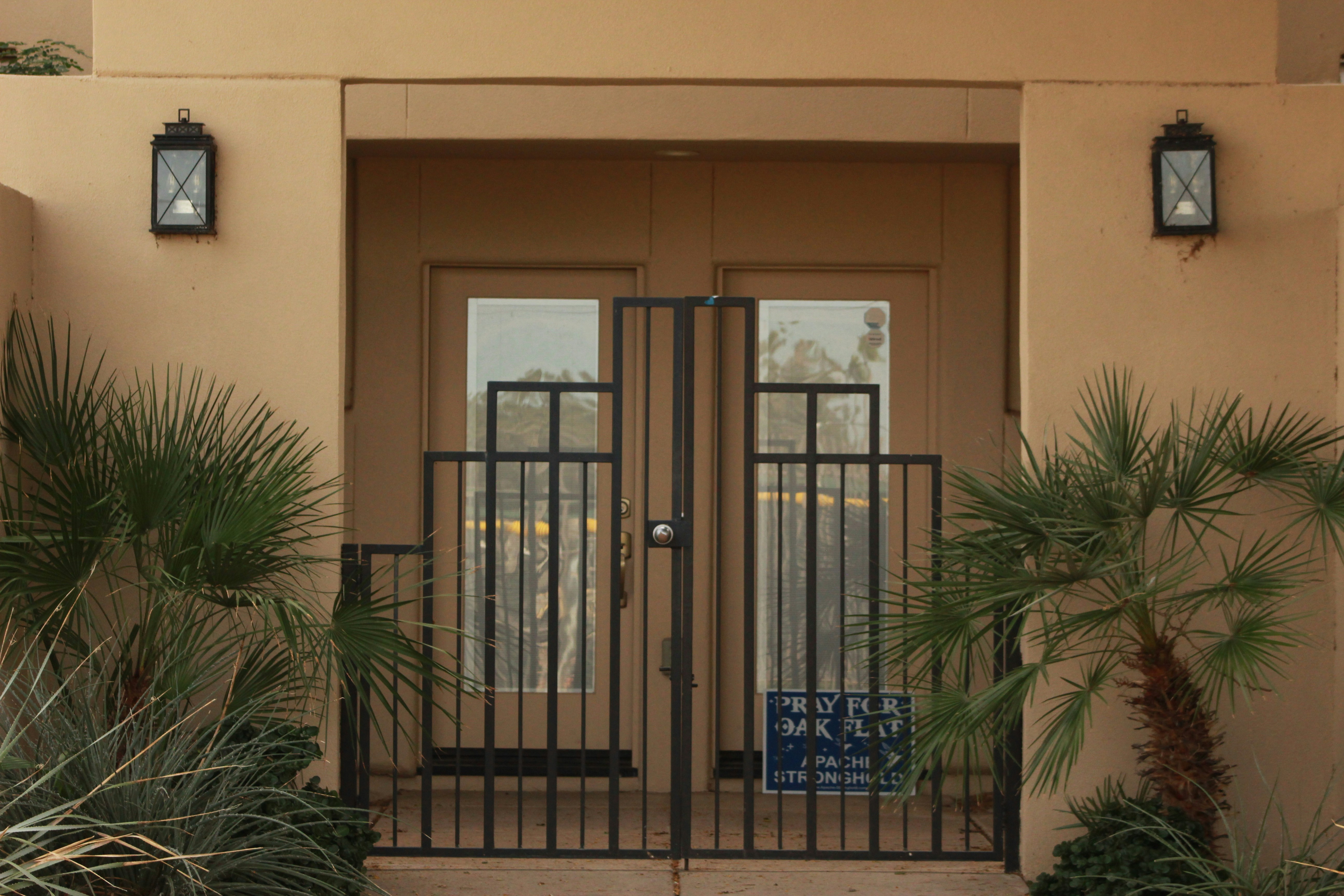 Symmetrical Entrance Gate Framed by Desert Foliage