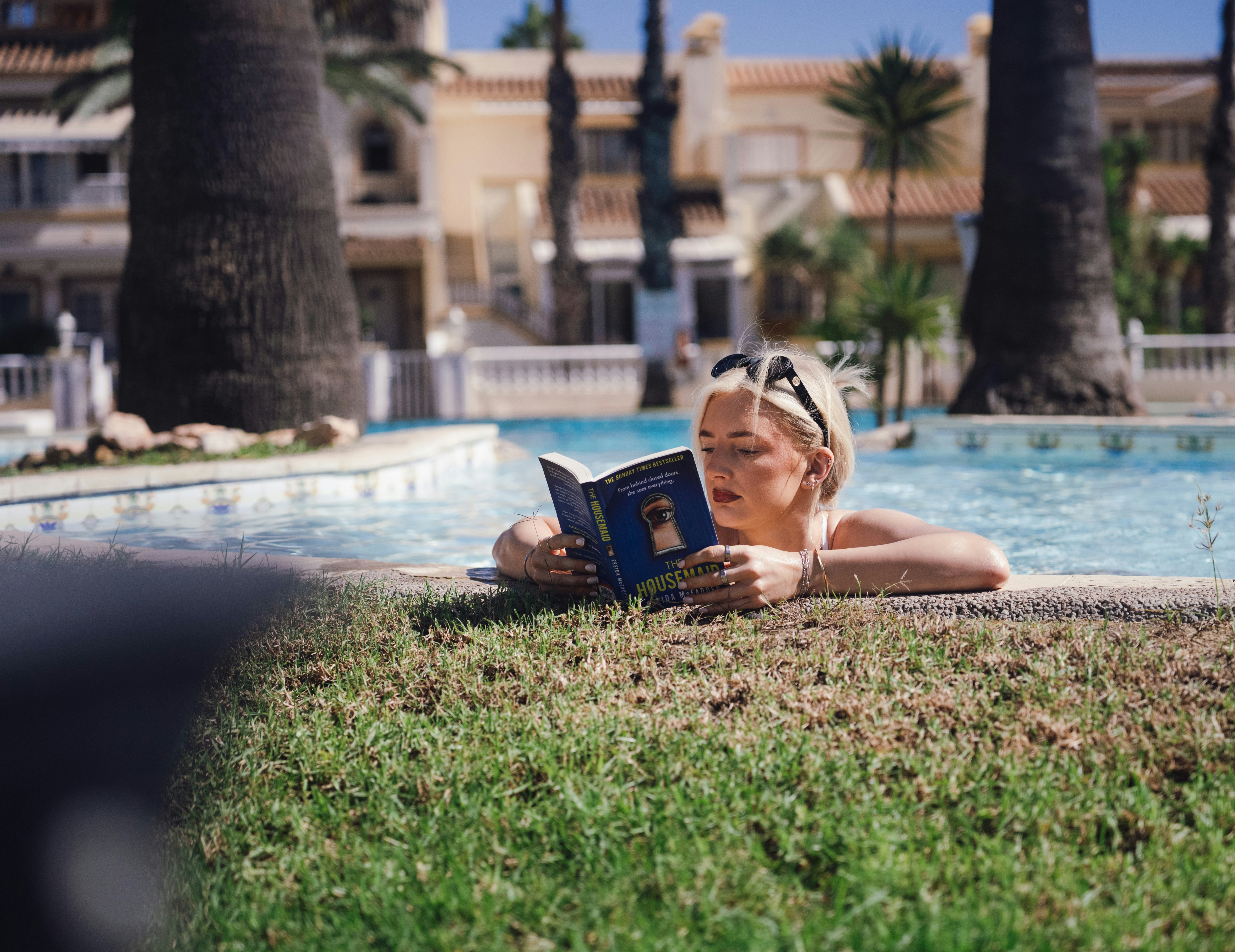 Poolside Page-Turner: A Quiet Read by Sunlit Waters