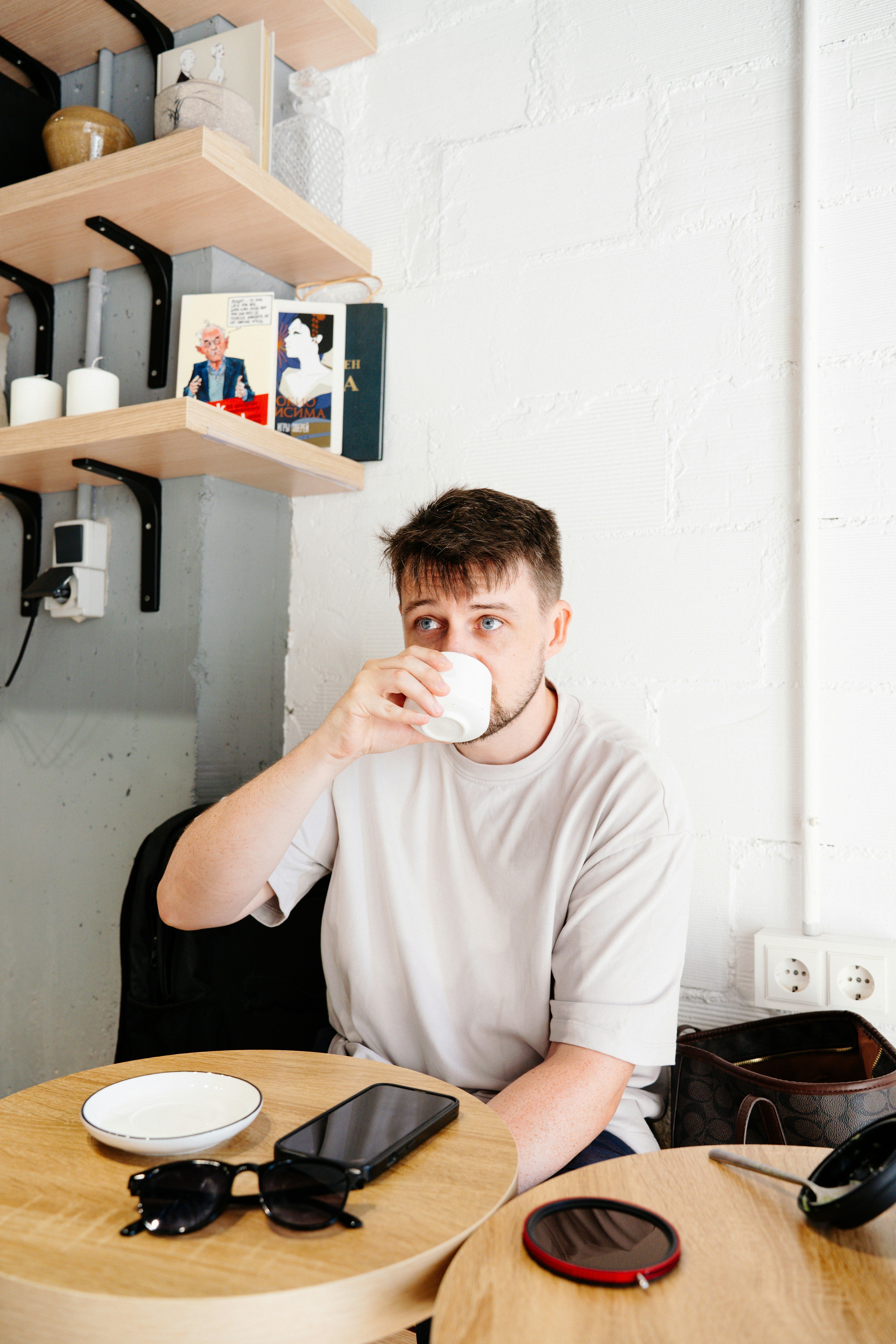 A Quiet Espresso Moment: Portrait of Contemplation in Minimal Light