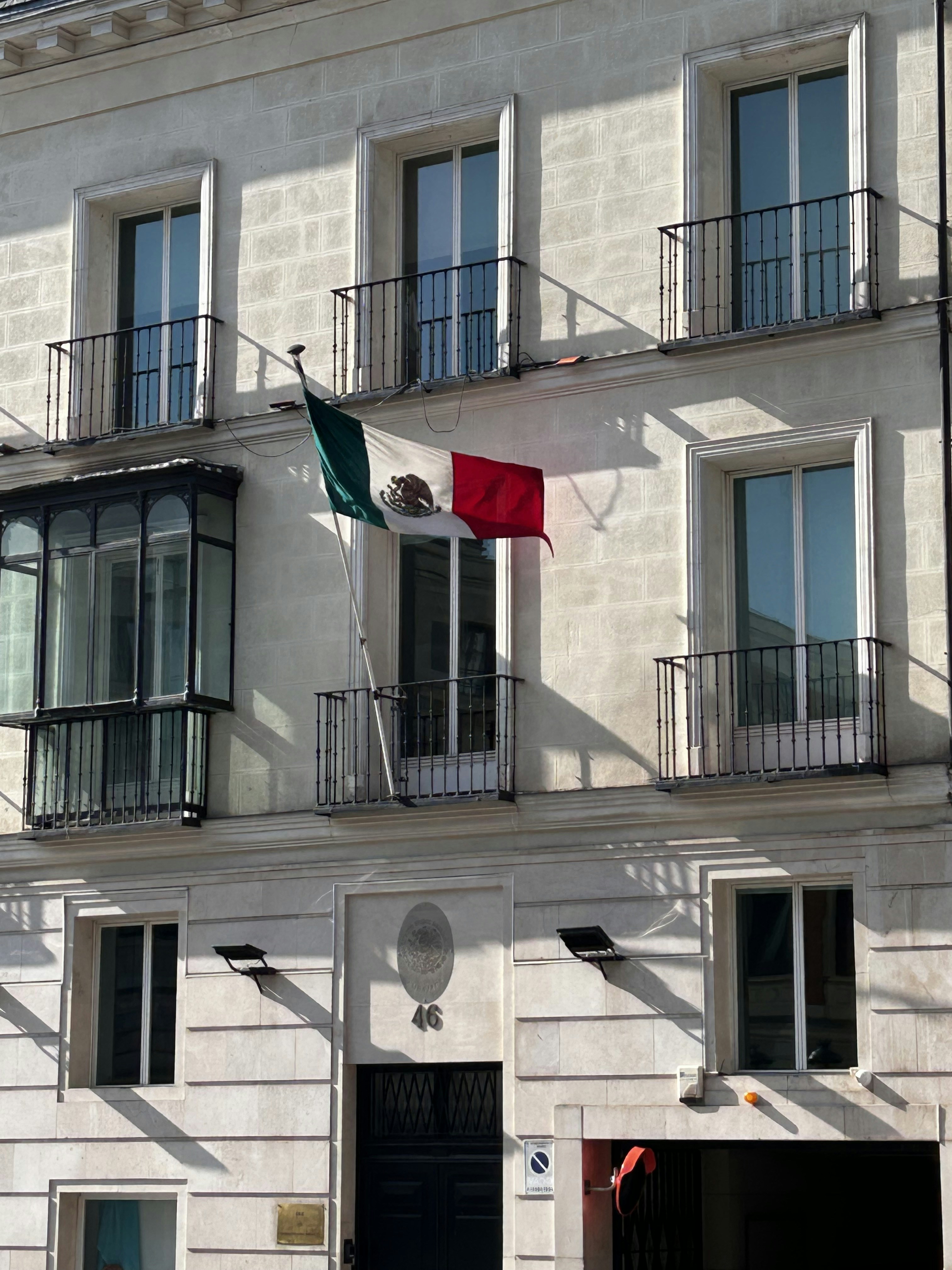 Flag on a sunlit Parisian Facade