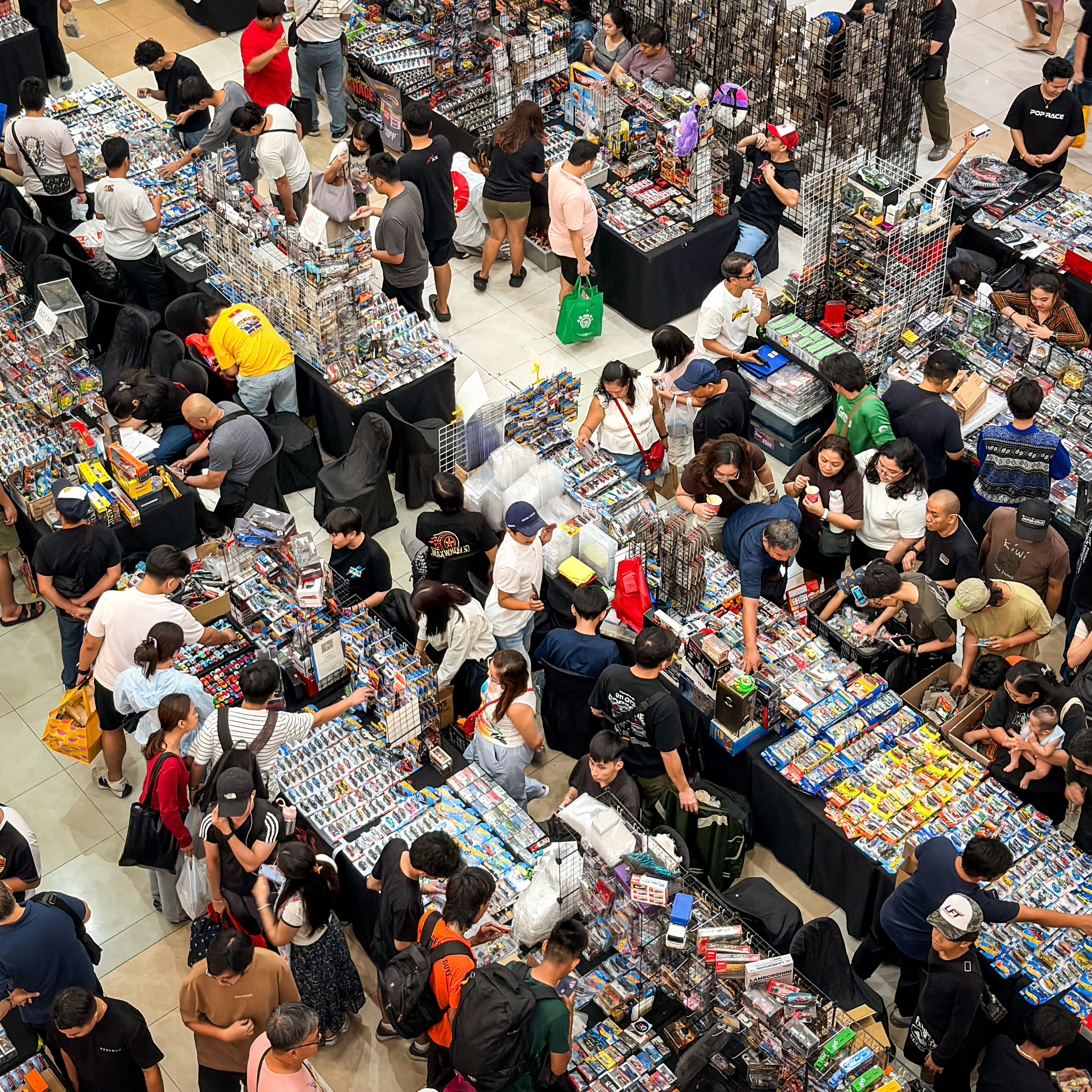 A Sea of Stacks: Bustling Hobby Market in a Packed Convention Hall