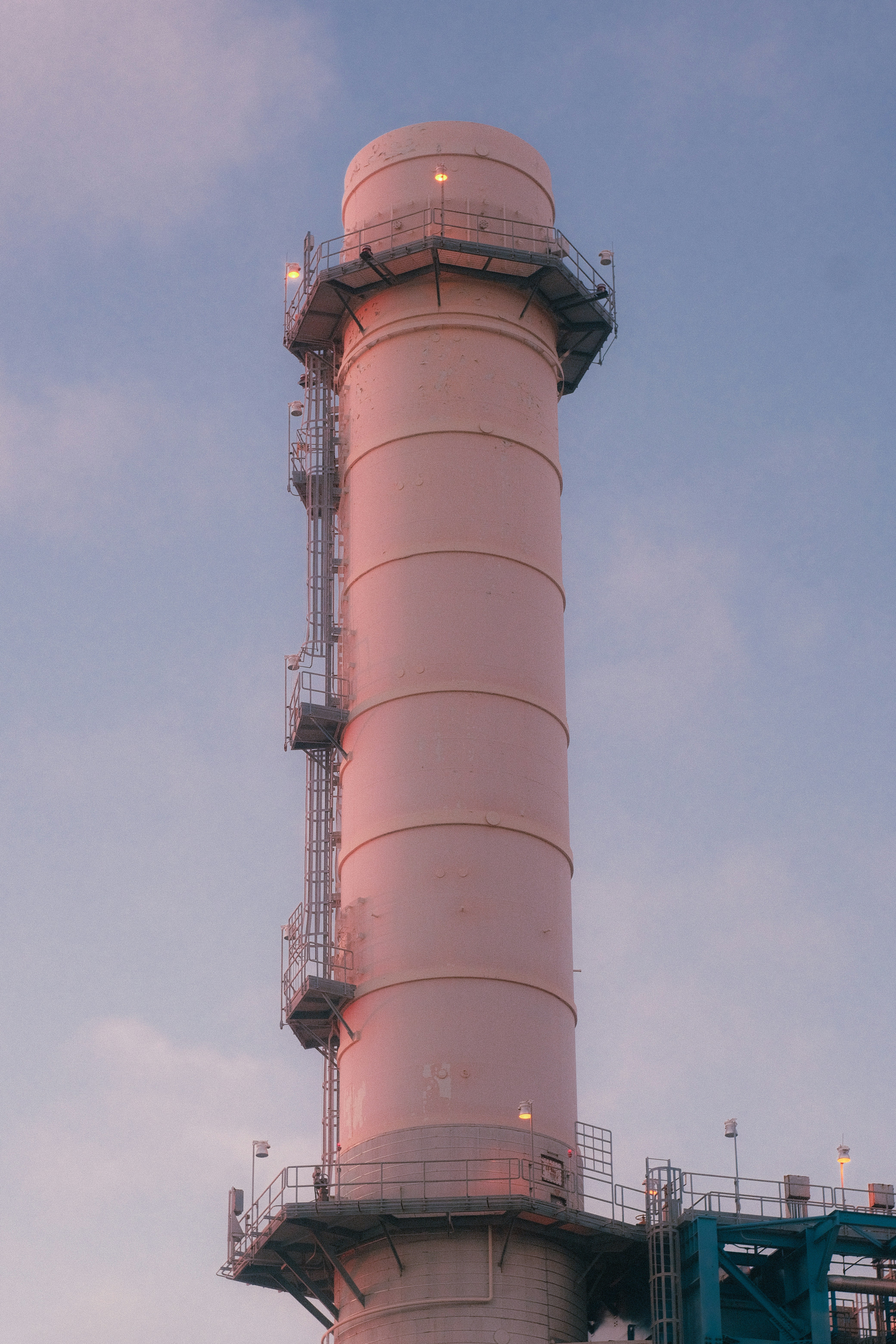 Industrial Colossus: A Quiet Sunset On the Smoke Stack