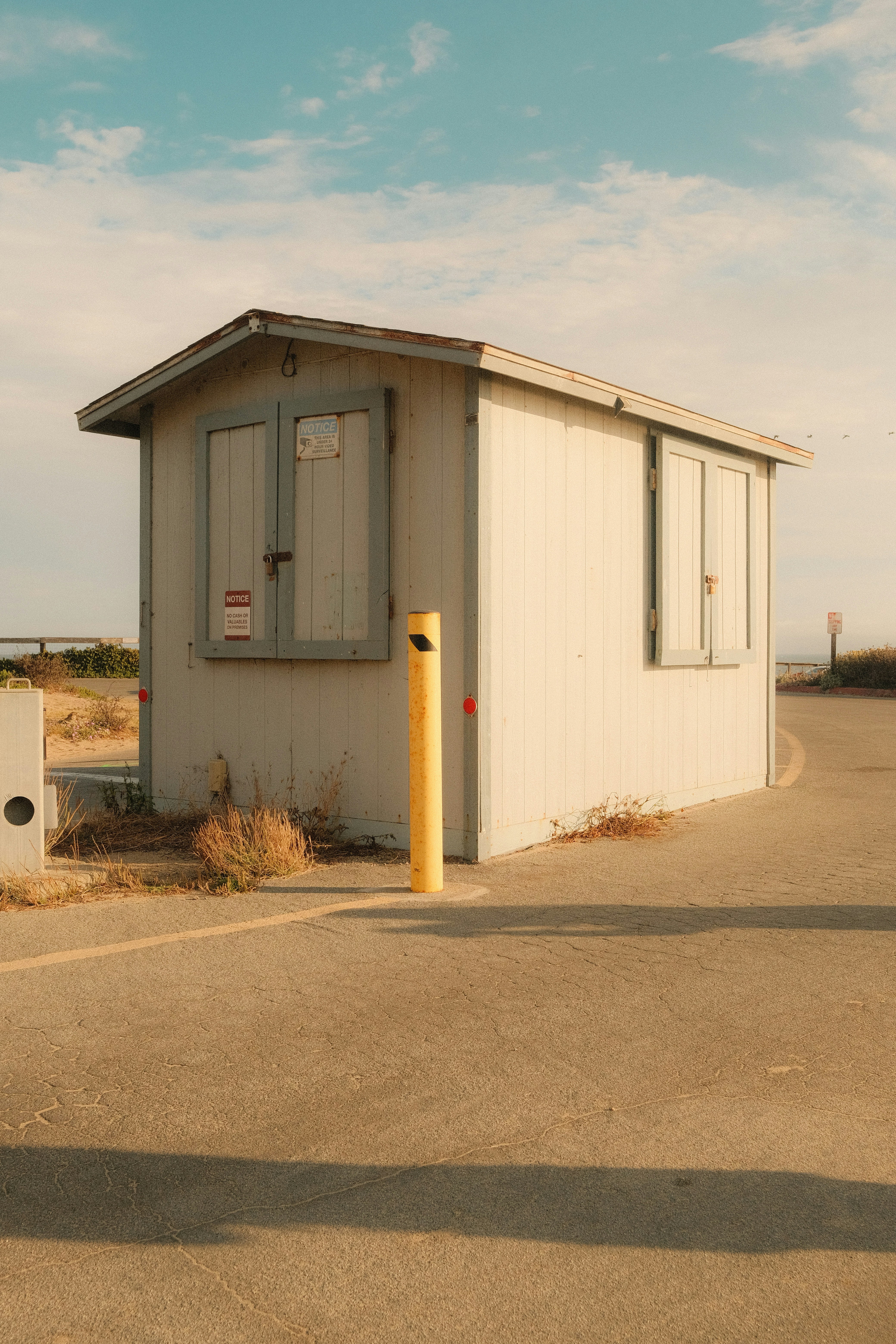 Coastal Guard Booth under Soft Sunset Light