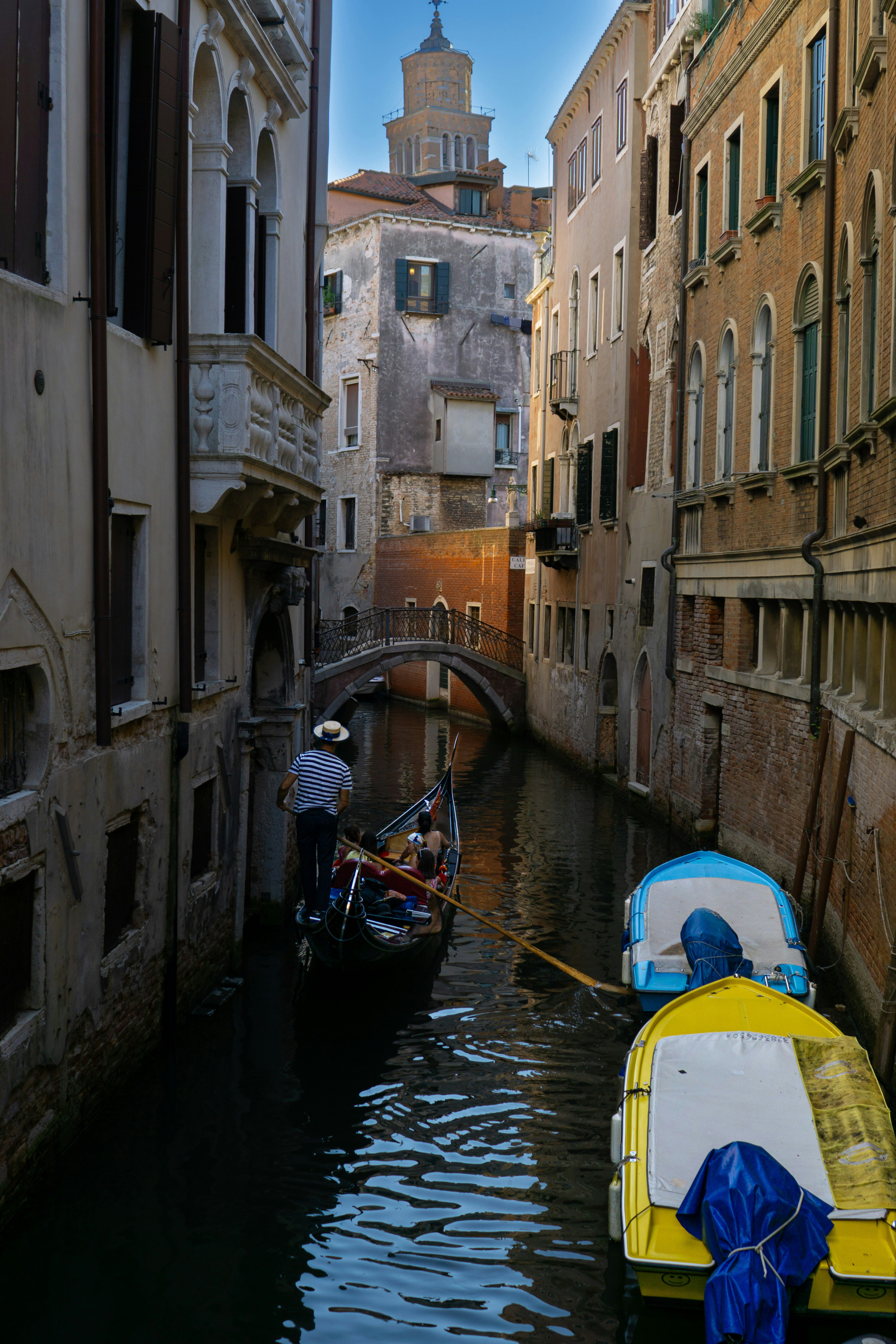 Gondola Corridor: A Narrow Venice Channel Between Timeworn Facades