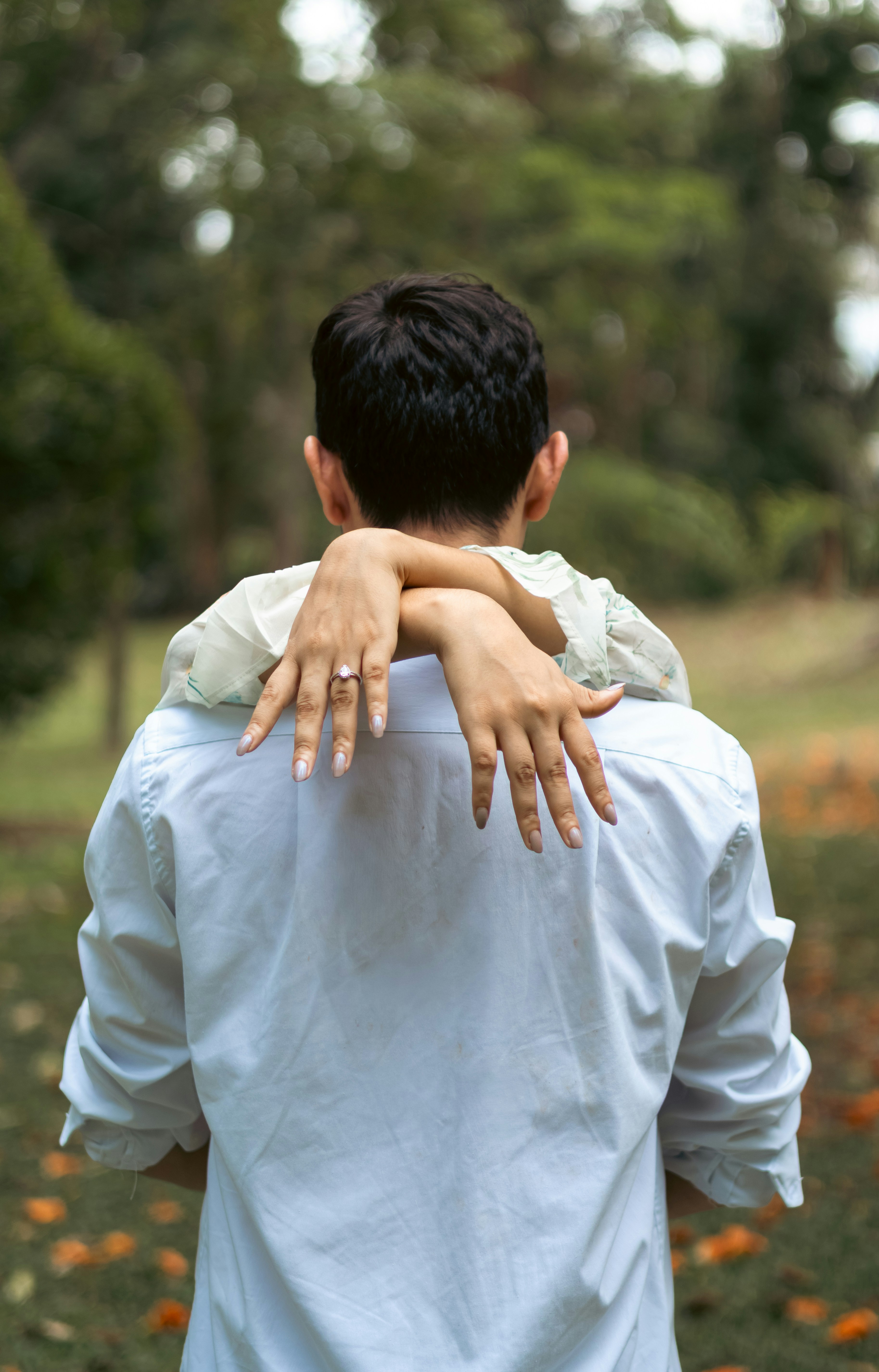 Back Portrait: Embrace Across the Shoulder in a Quiet Park