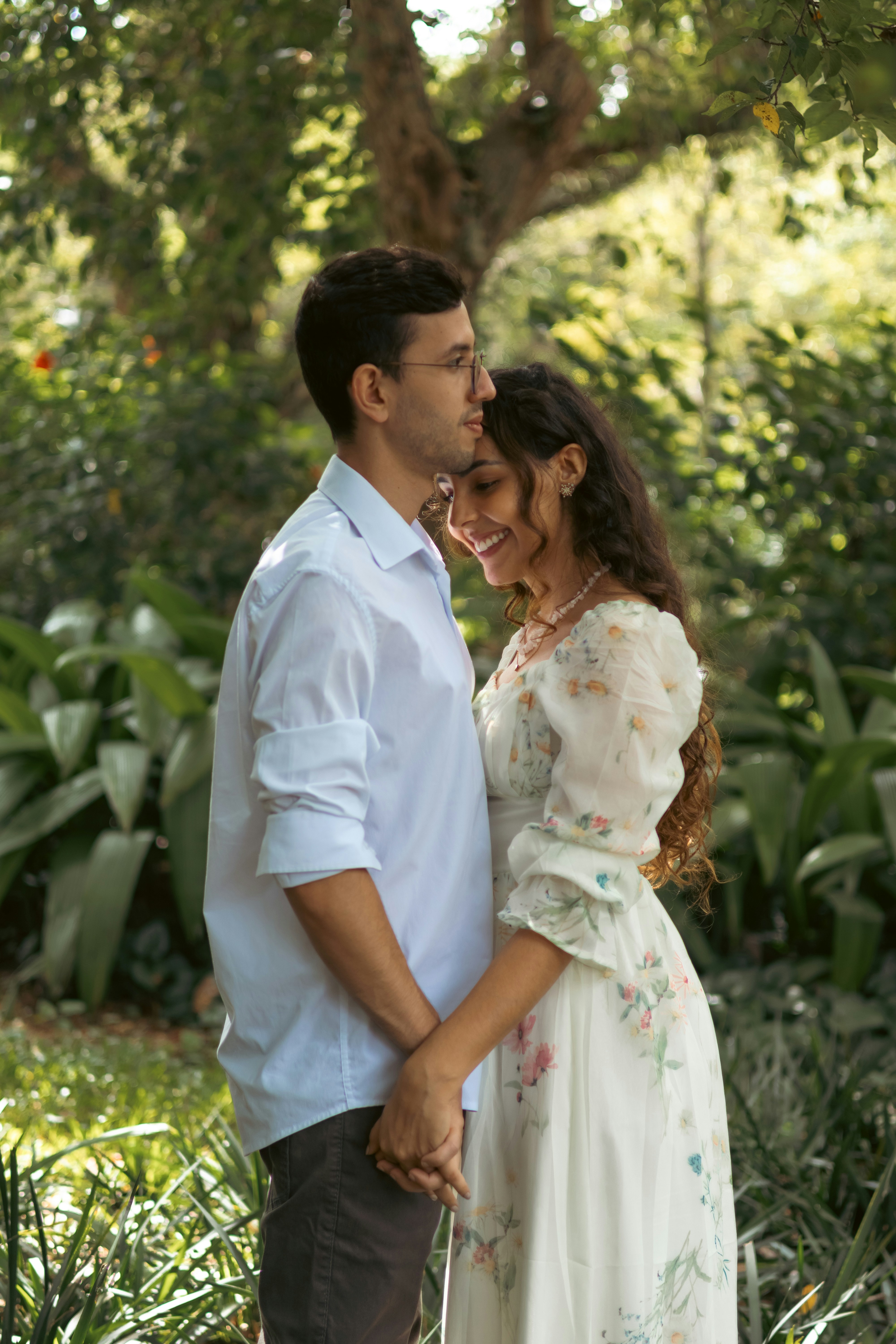 Tender Embrace in Dappled Light