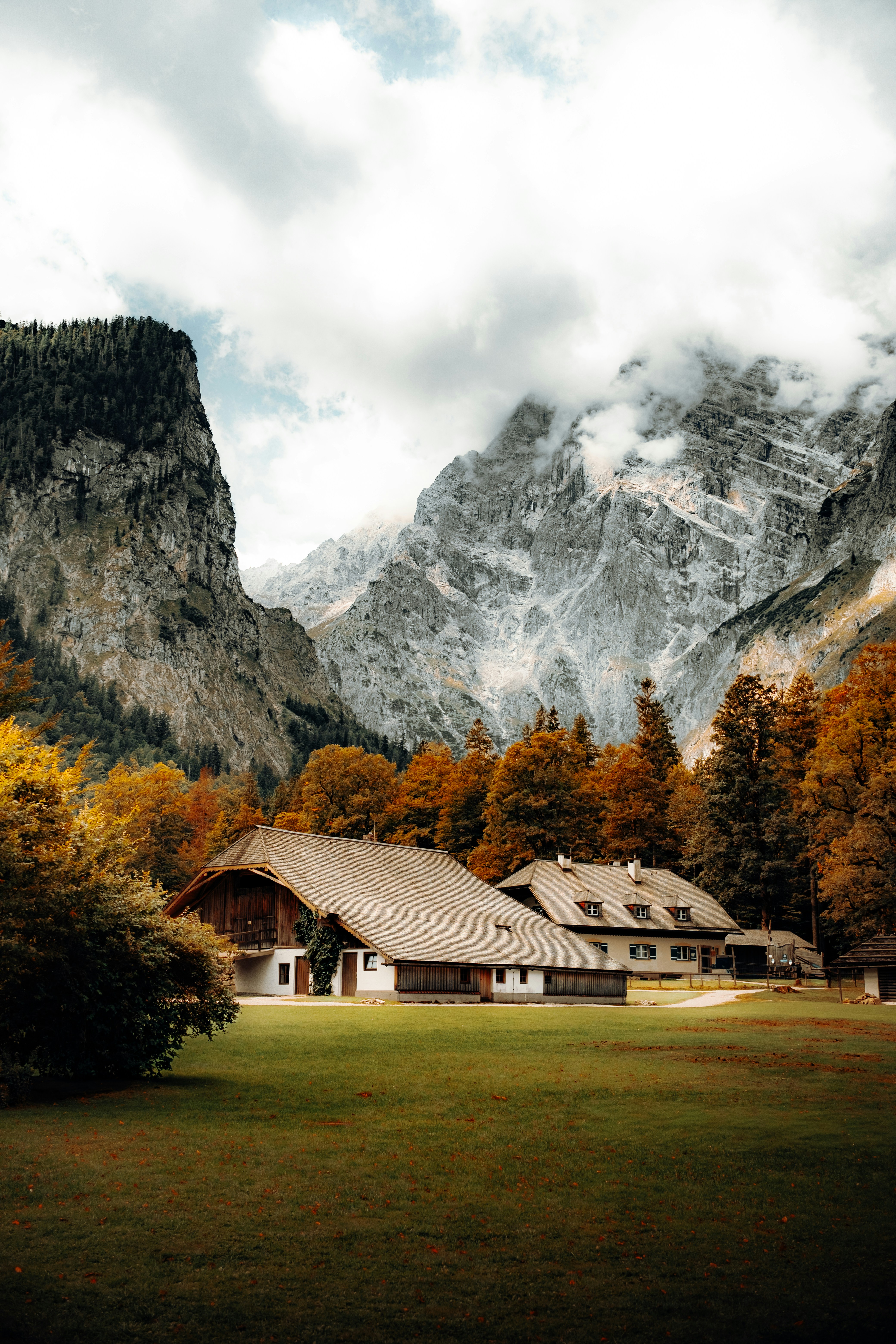 Autumn Alps Lodge Beneath Towering Peaks