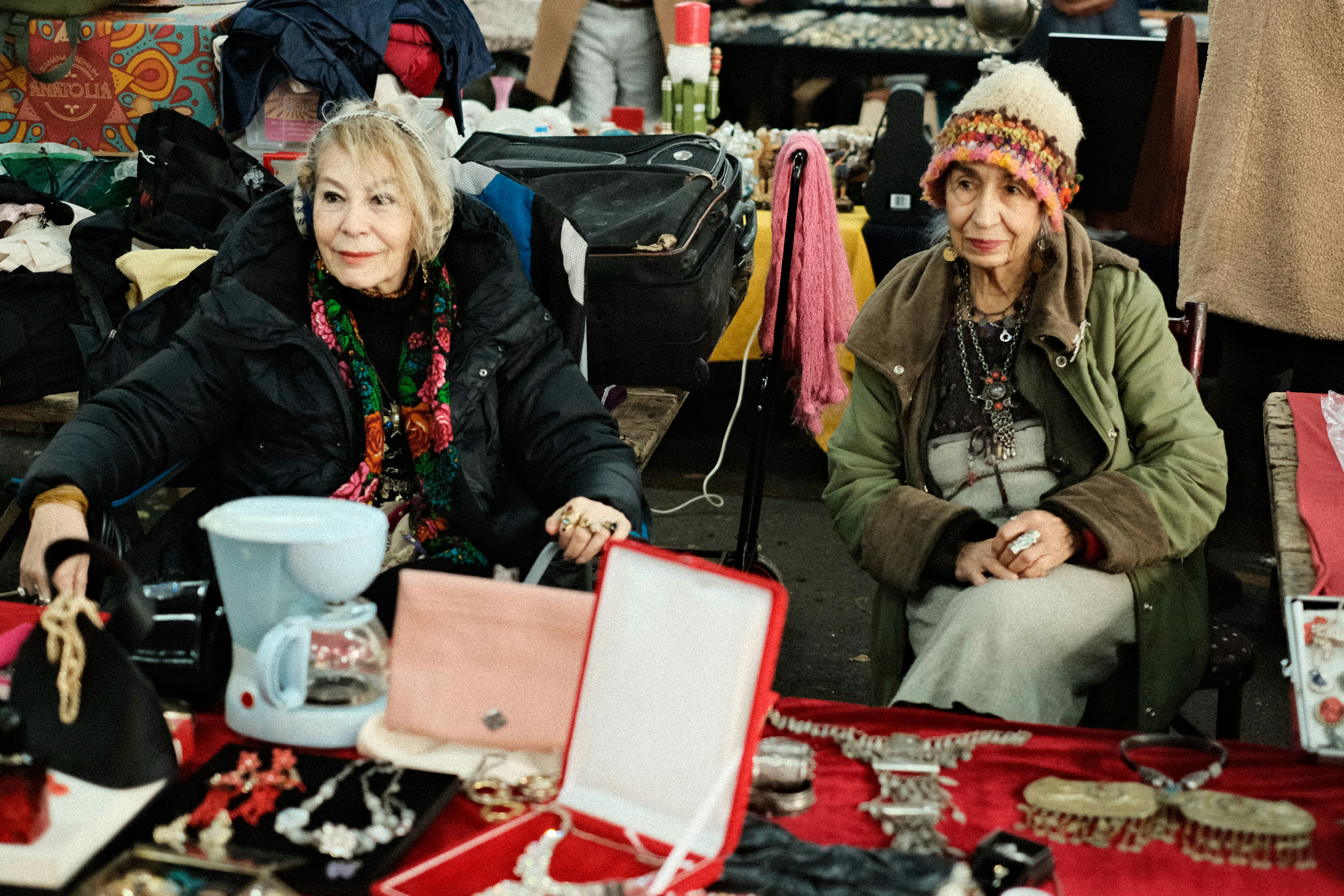 Market Stalls and Shared Smiles: A Warm Moment Across a Bustling Bazaar